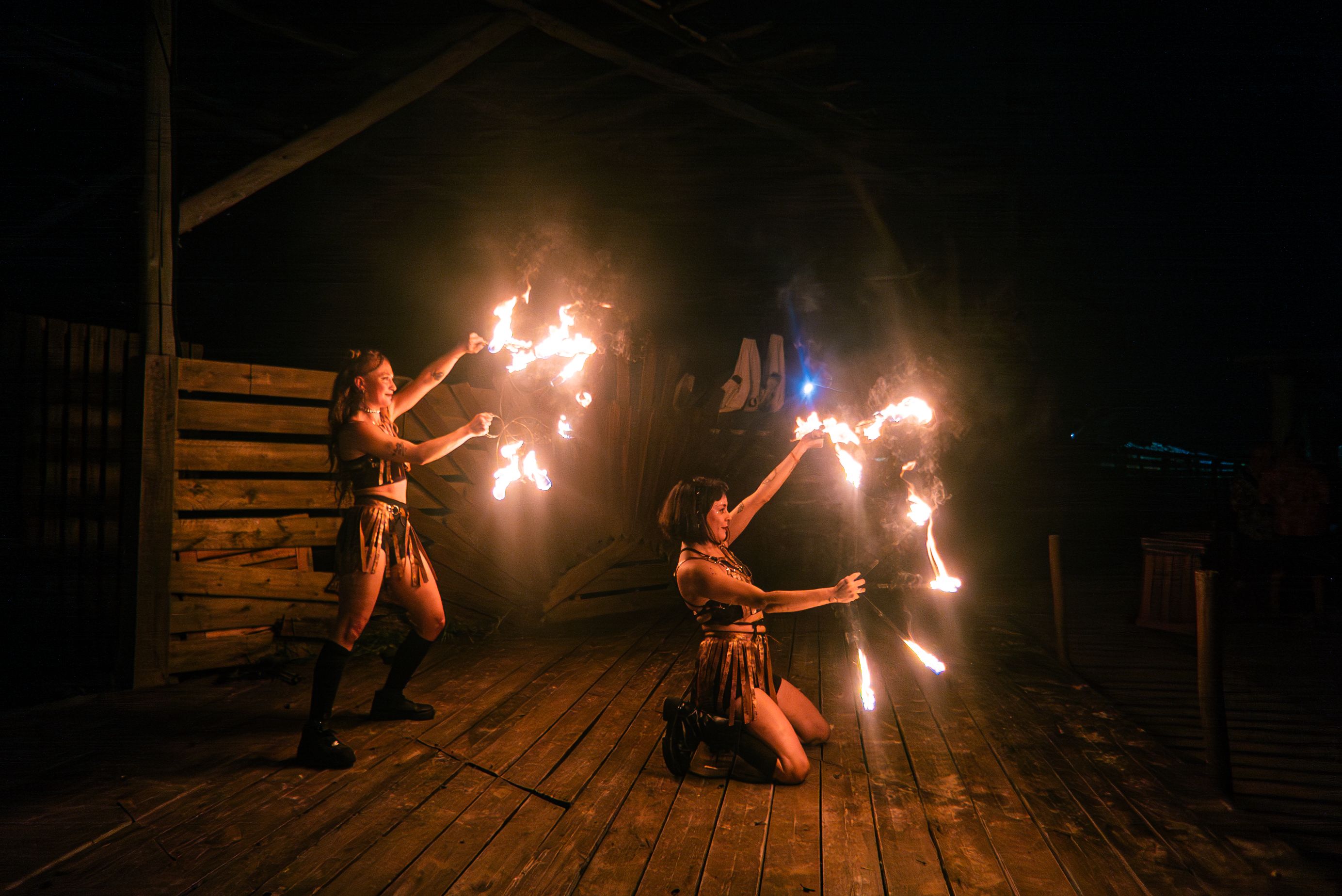 Women with Burning Torches on Stage · Free Stock Photo