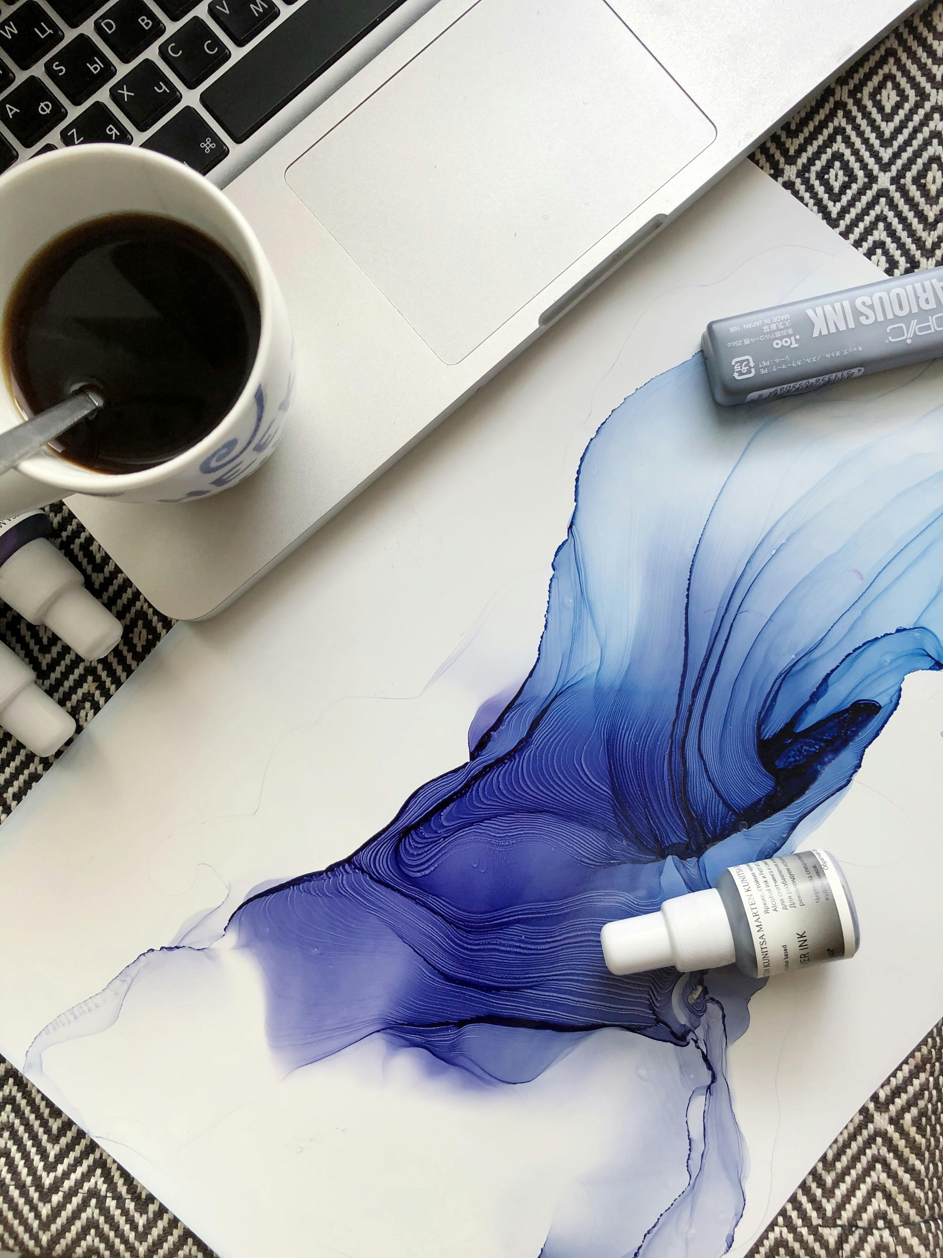 Ink Art on Desk with Laptop · Free Stock Photo