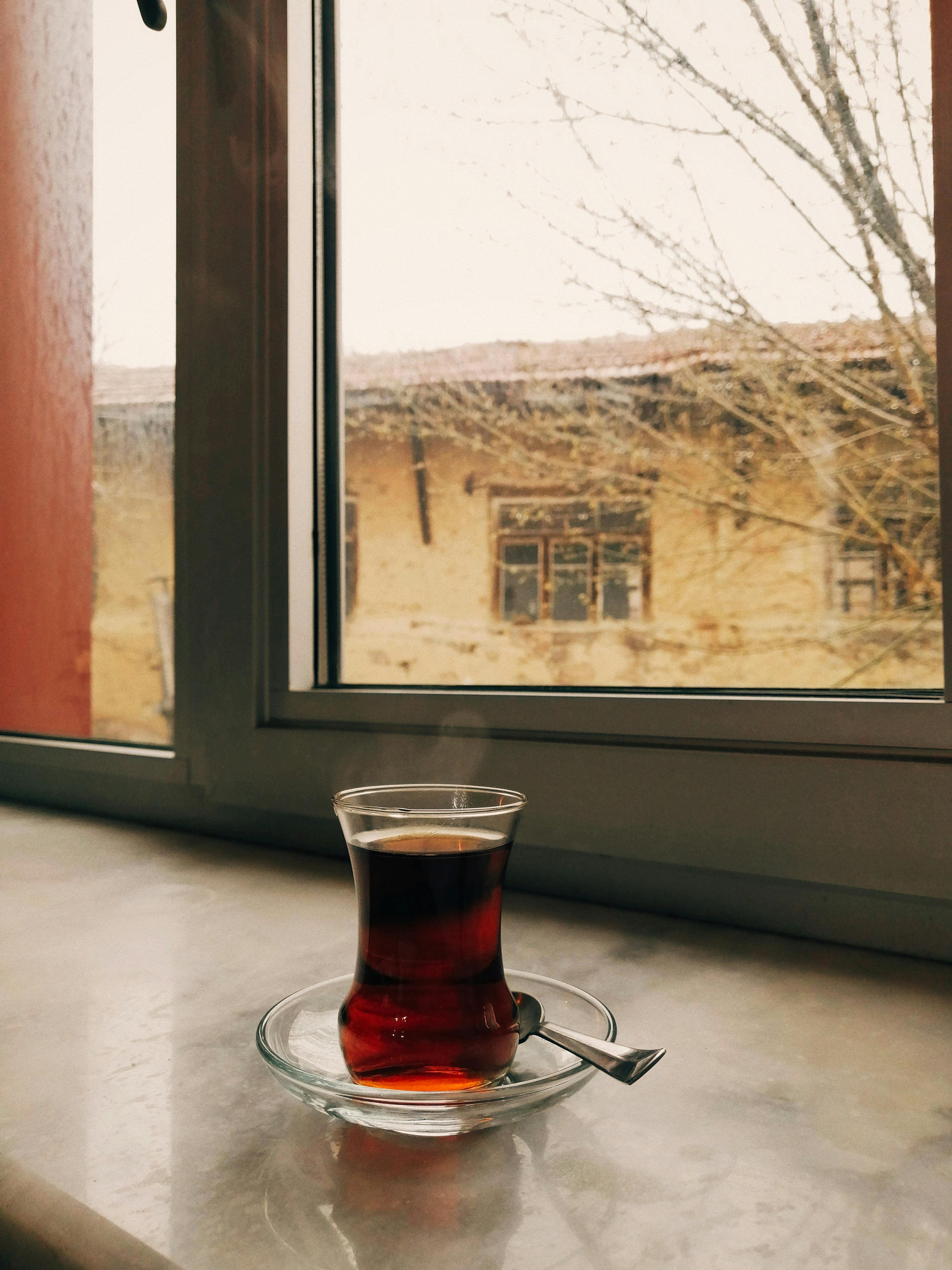 Glass of Delicious Hot Tea on Windowsill · Free Stock Photo