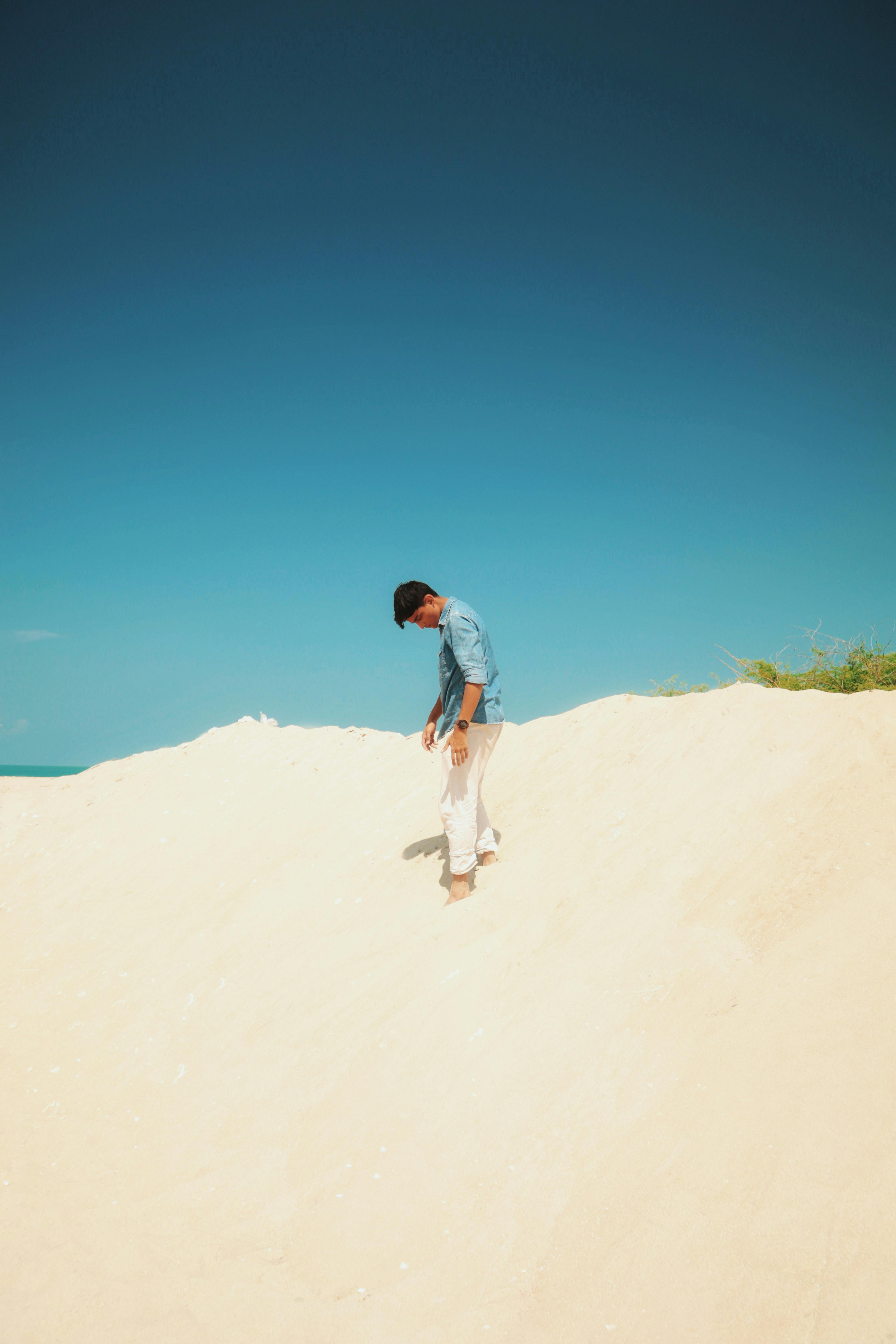Man Standing on a Dune · Free Stock Photo