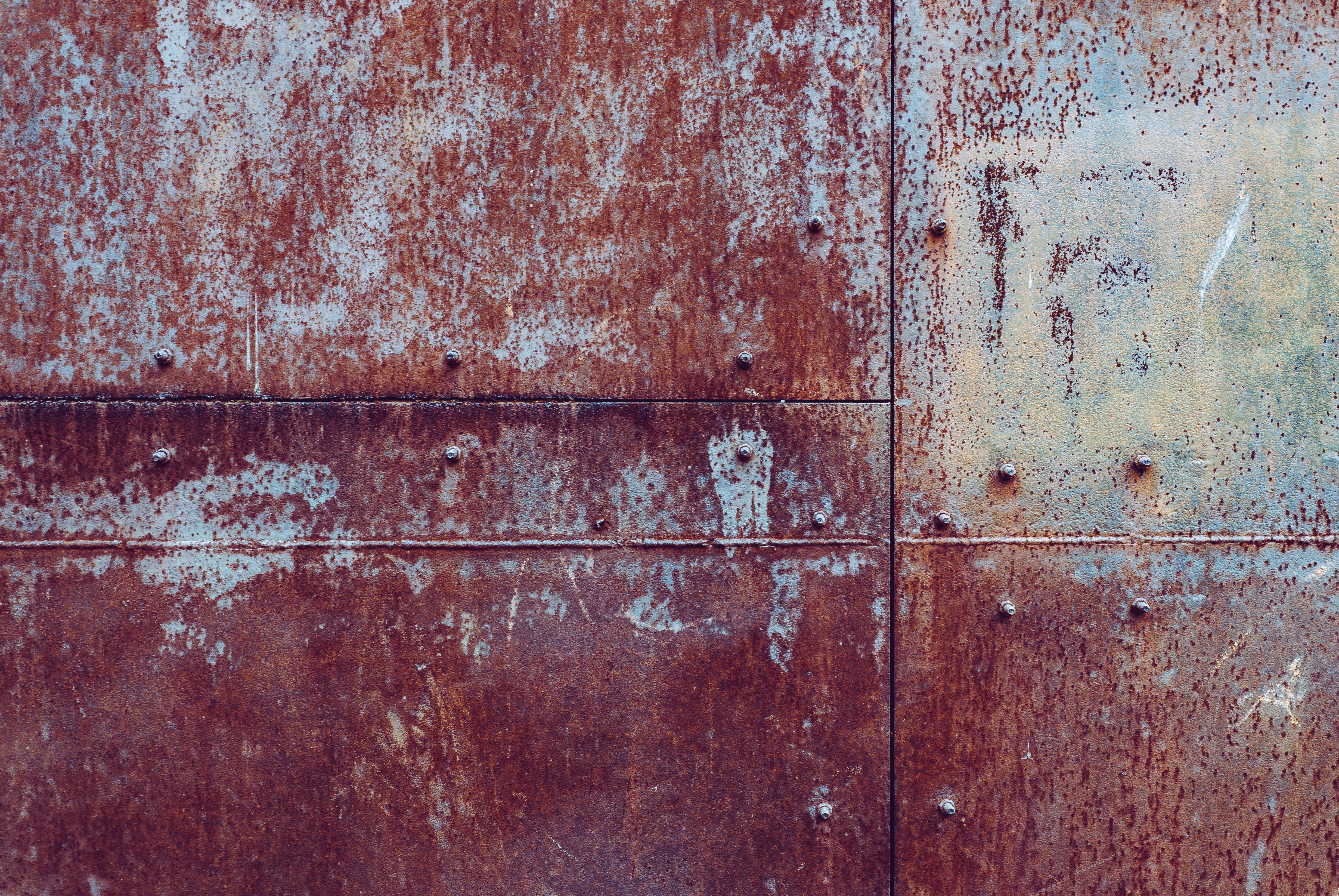 A close up of a rusty metal wall · Free Stock Photo
