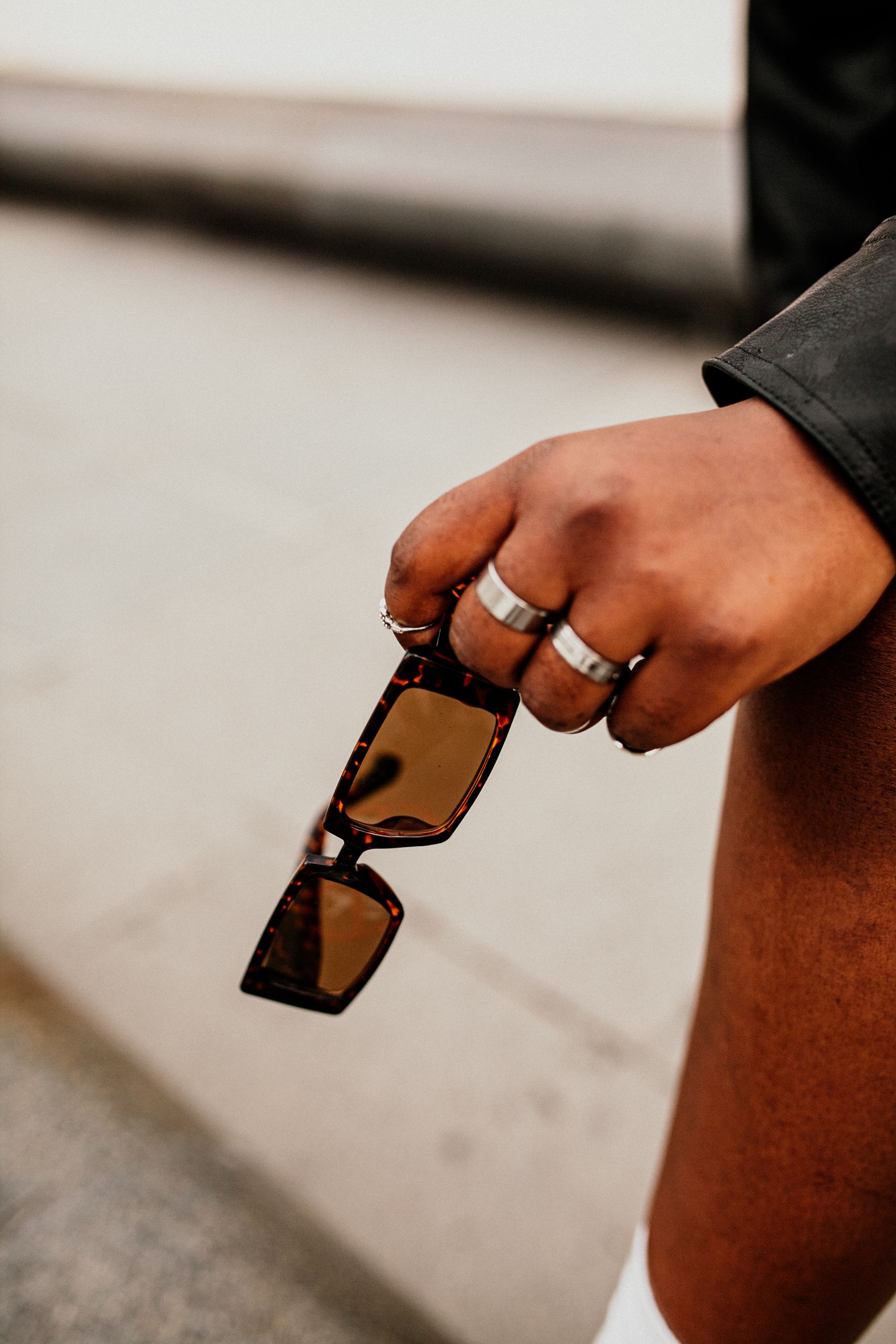 Hand Holding Sunglasses · Free Stock Photo