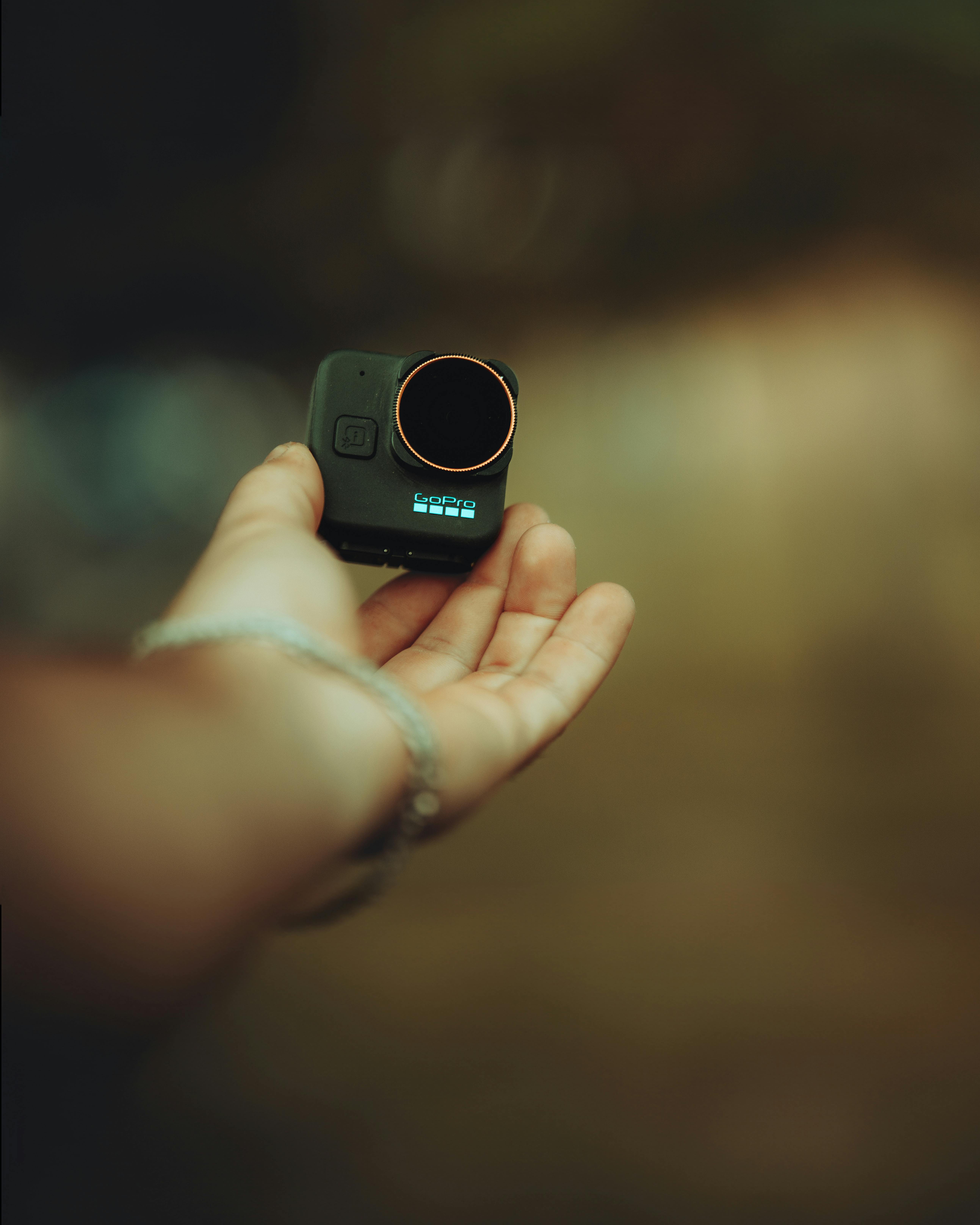 Man Hand Holding GoPro Camera · Free Stock Photo