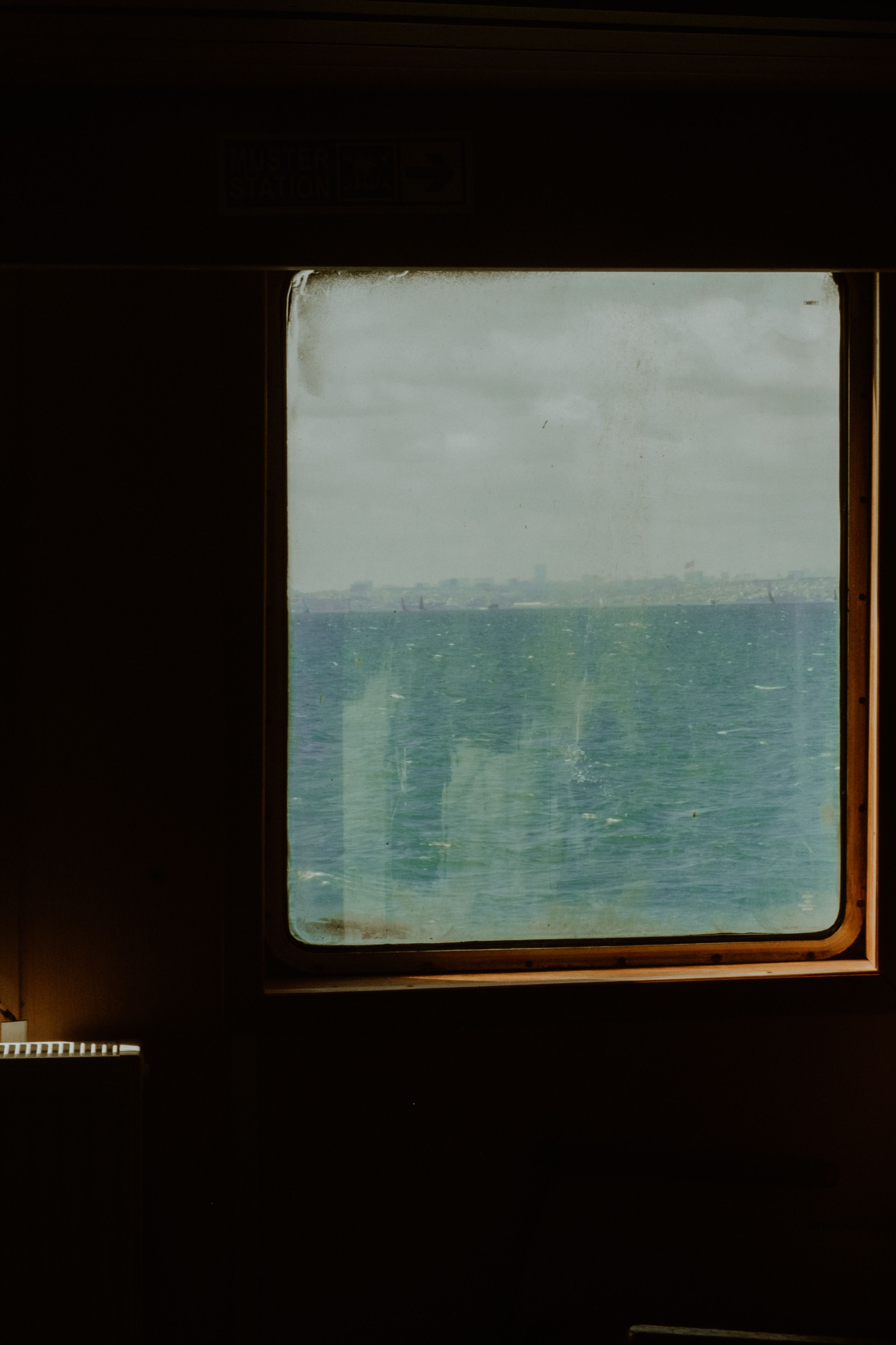 Sea behind Ship Window · Free Stock Photo