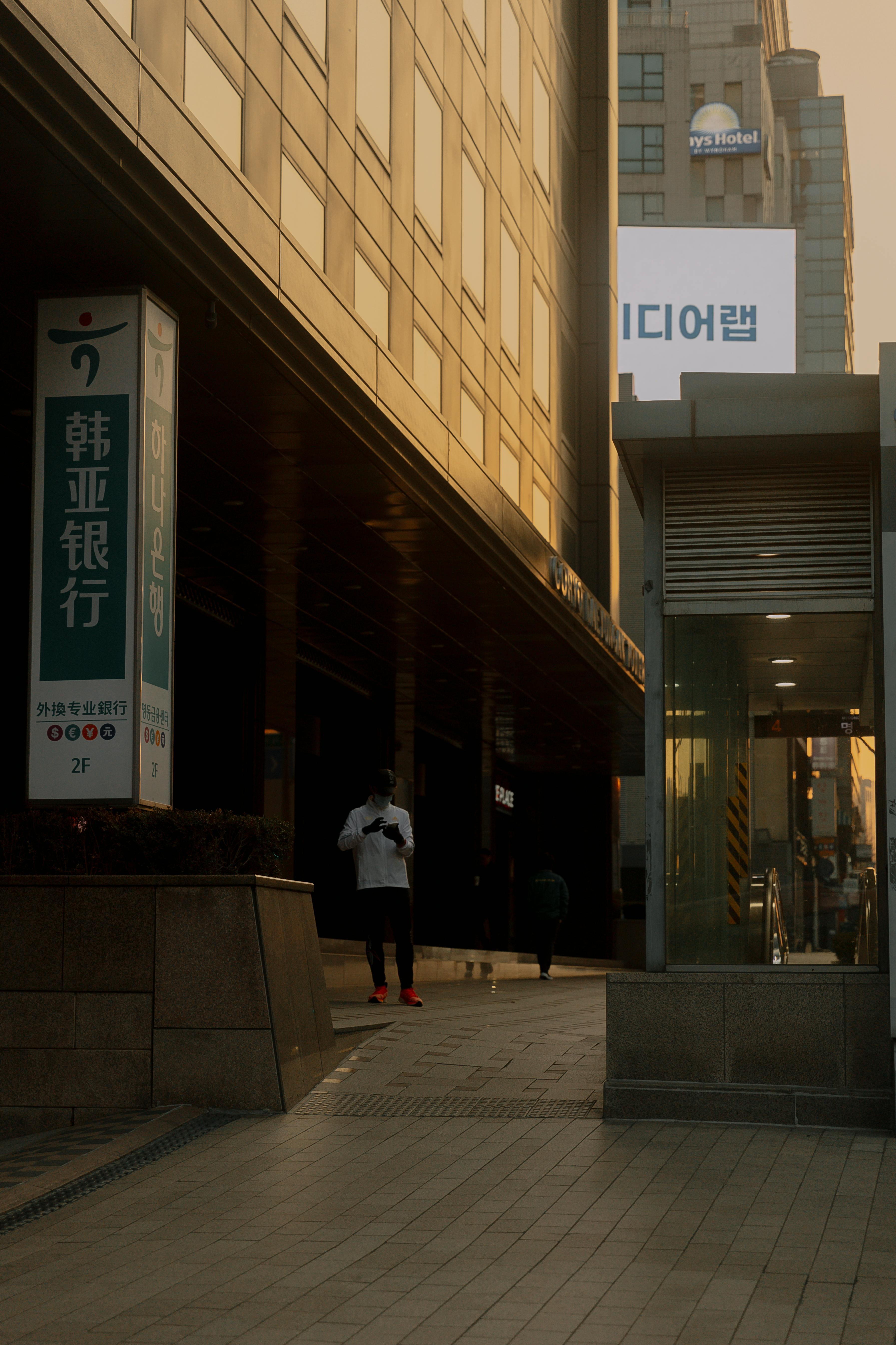 Man Standing near Building · Free Stock Photo