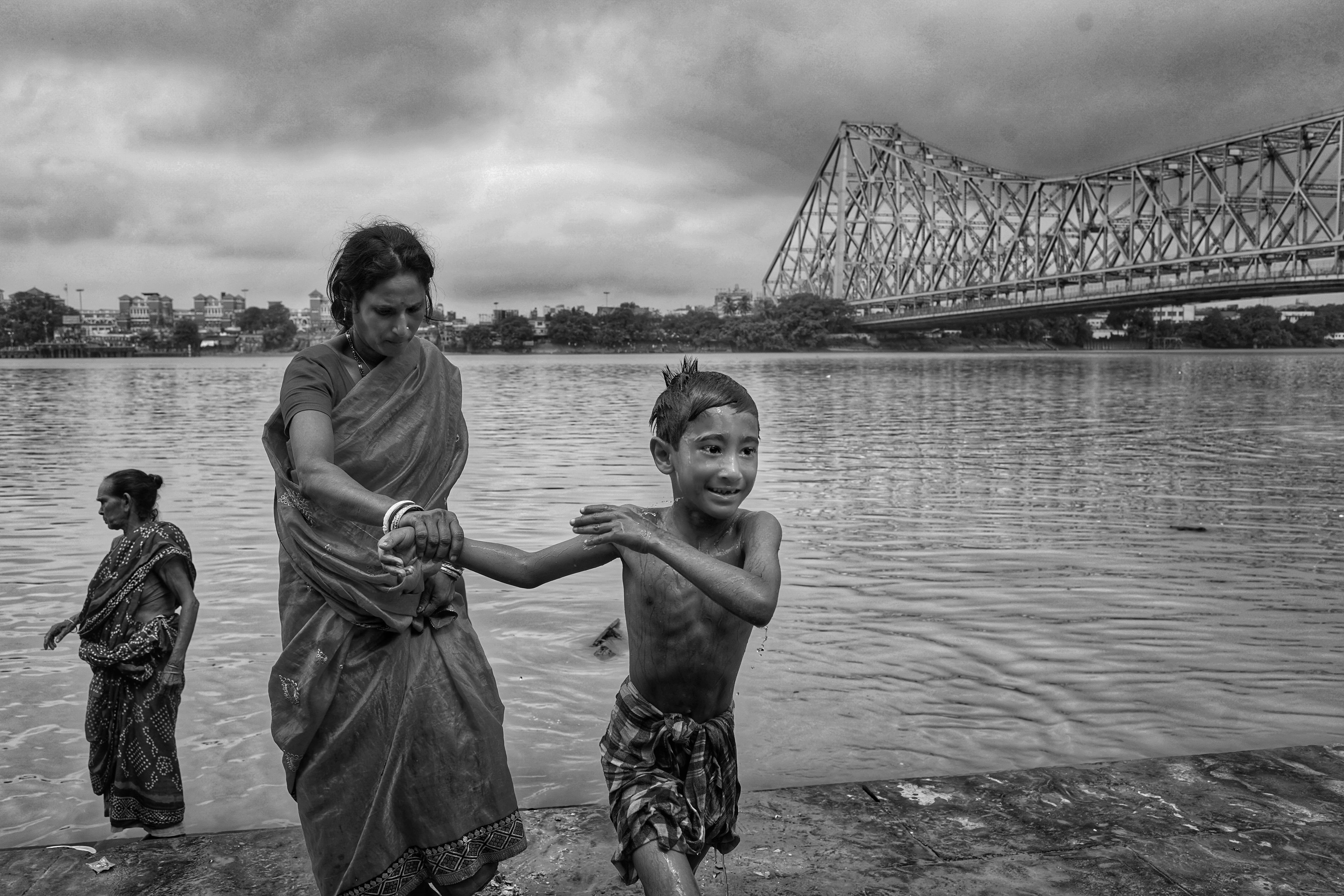 Mother with Son at River · Free Stock Photo