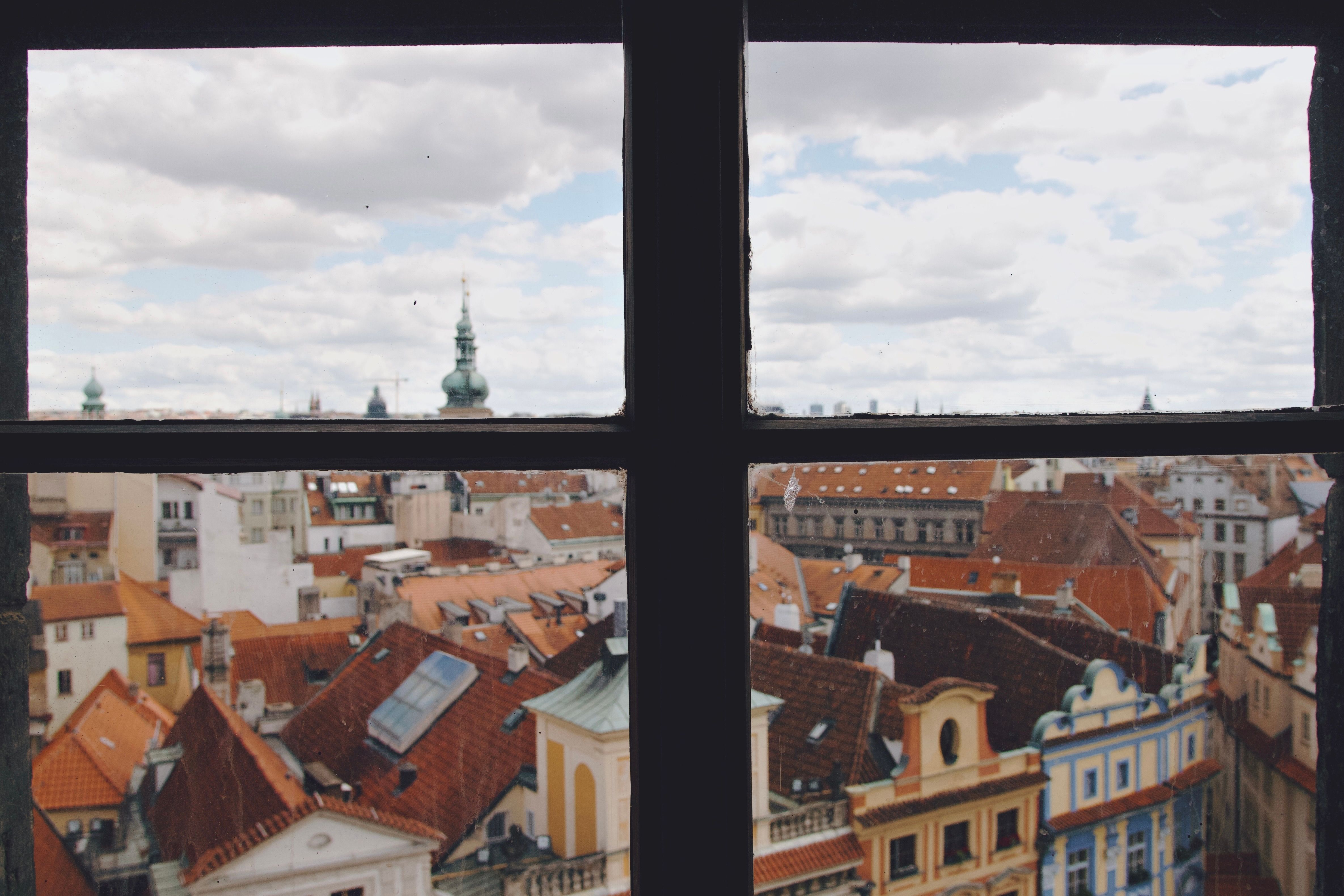 Old Town Houses seen through a Window · Free Stock Photo