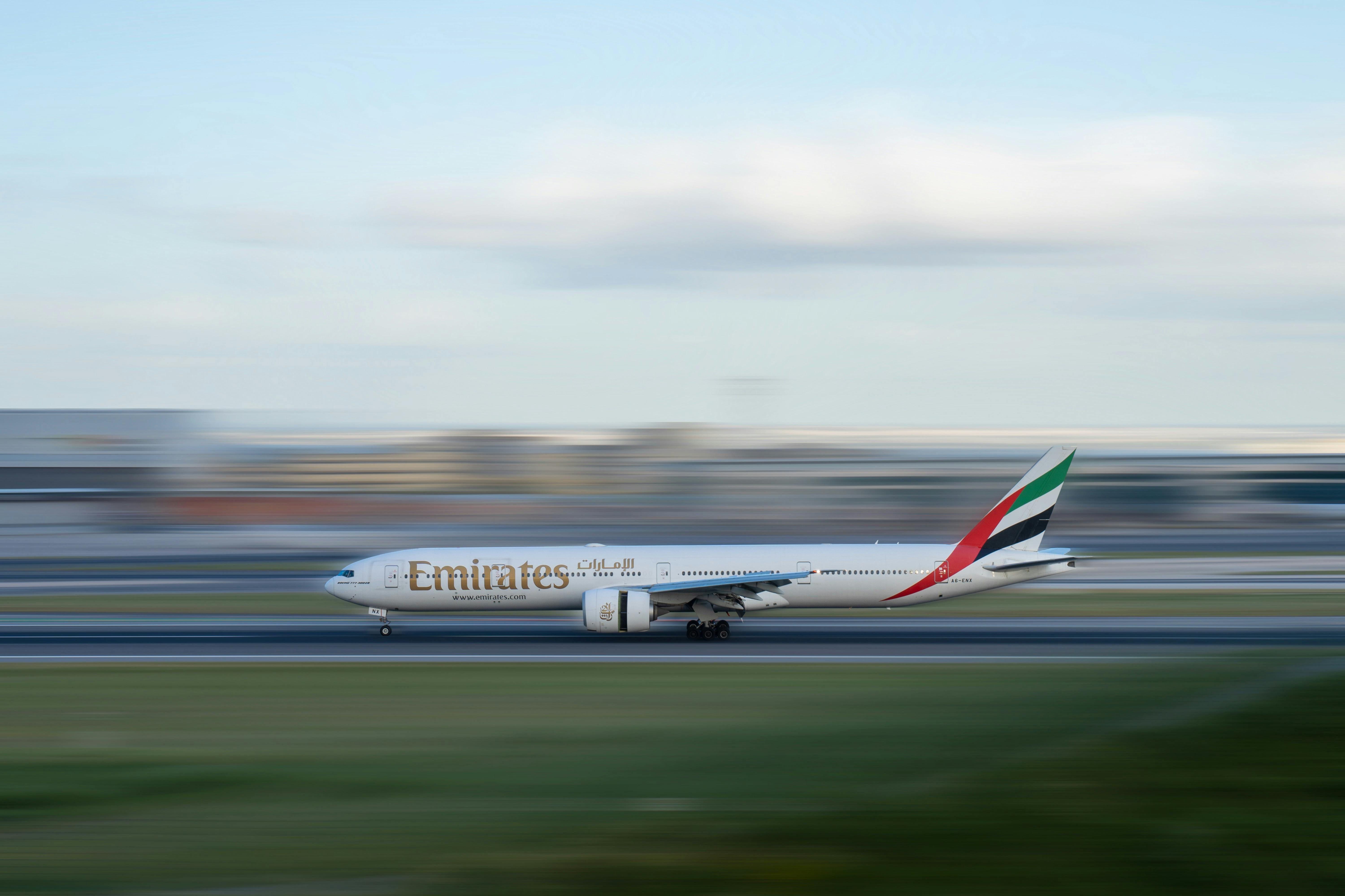 Emirates Airlines Airplane on Runway · Free Stock Photo
