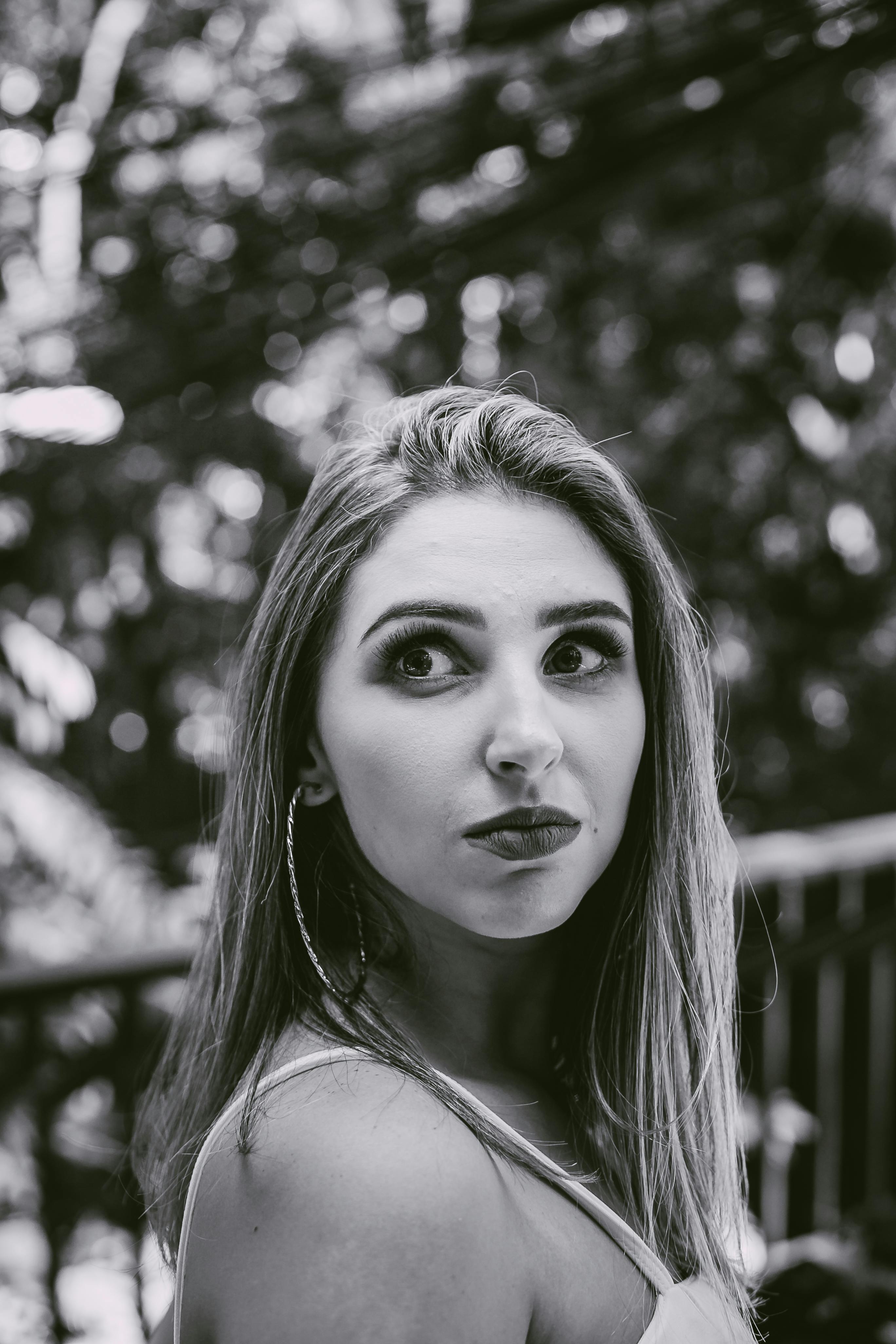 Grayscale Portrait Photo of Woman Looking Back · Free Stock Photo