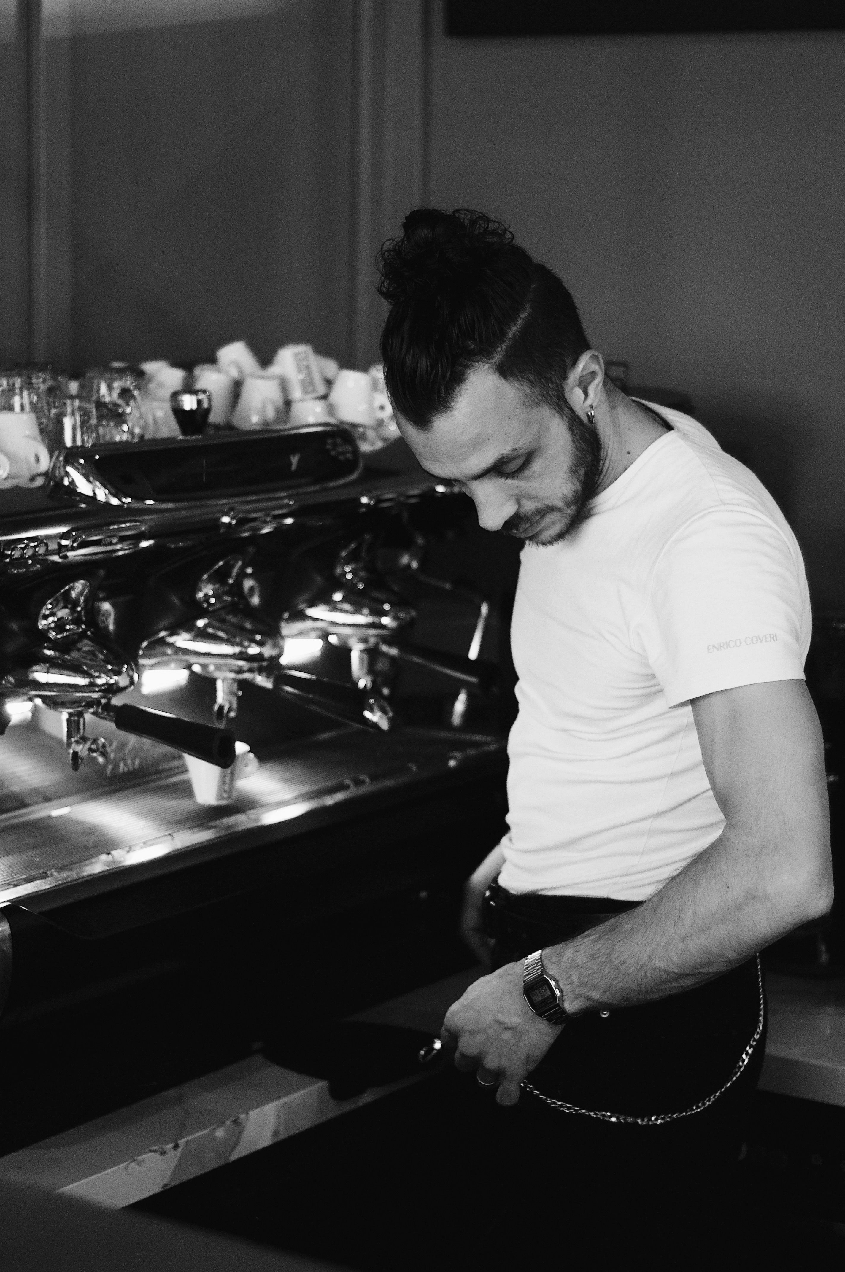 Back of a Male Barista Working in a Cafe · Free Stock Photo
