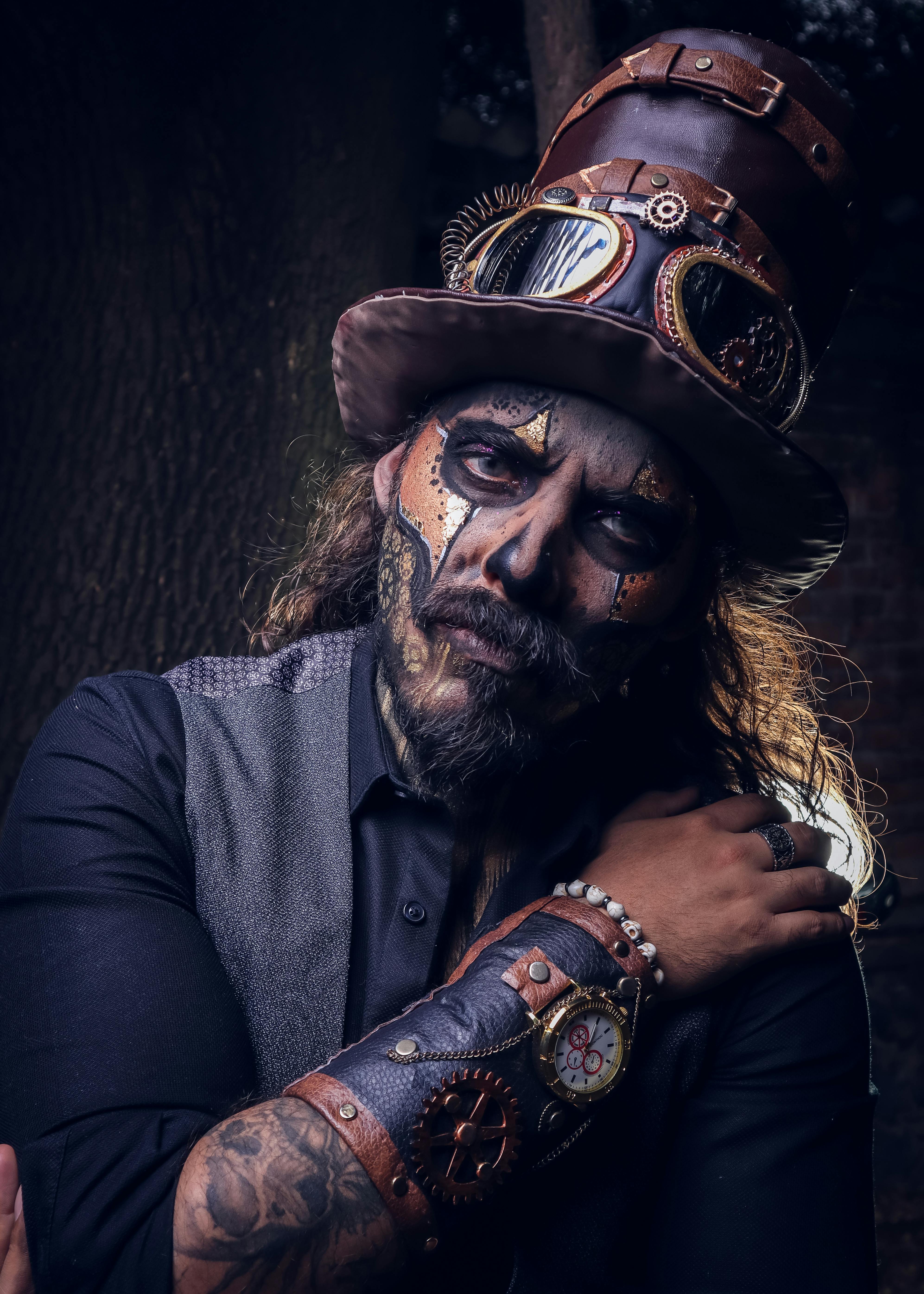 Man Wearing Steampunk Attire Posing · Free Stock Photo