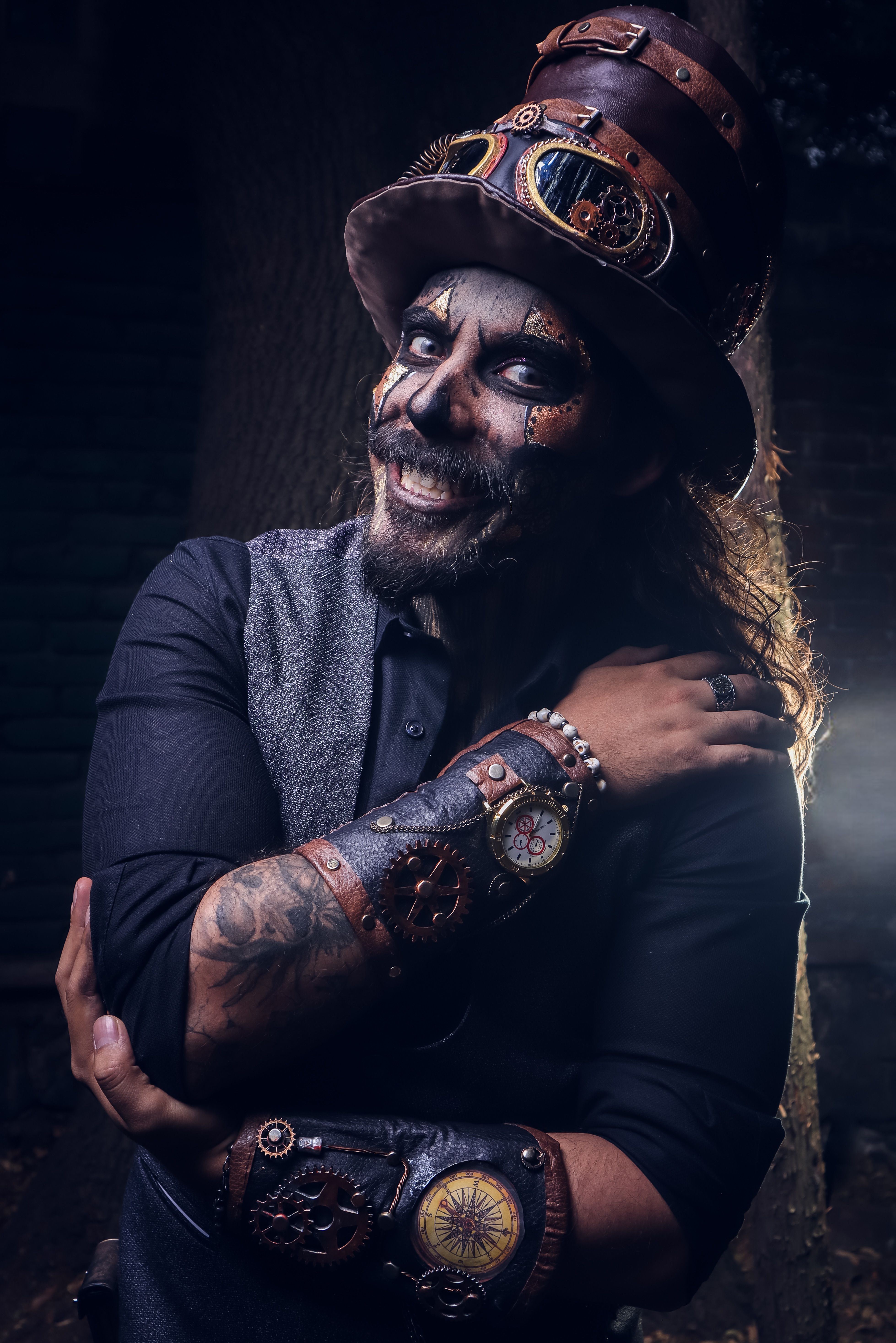 Smiling Man in Steampunk Style Leather Top Hat and Bracers · Free Stock ...
