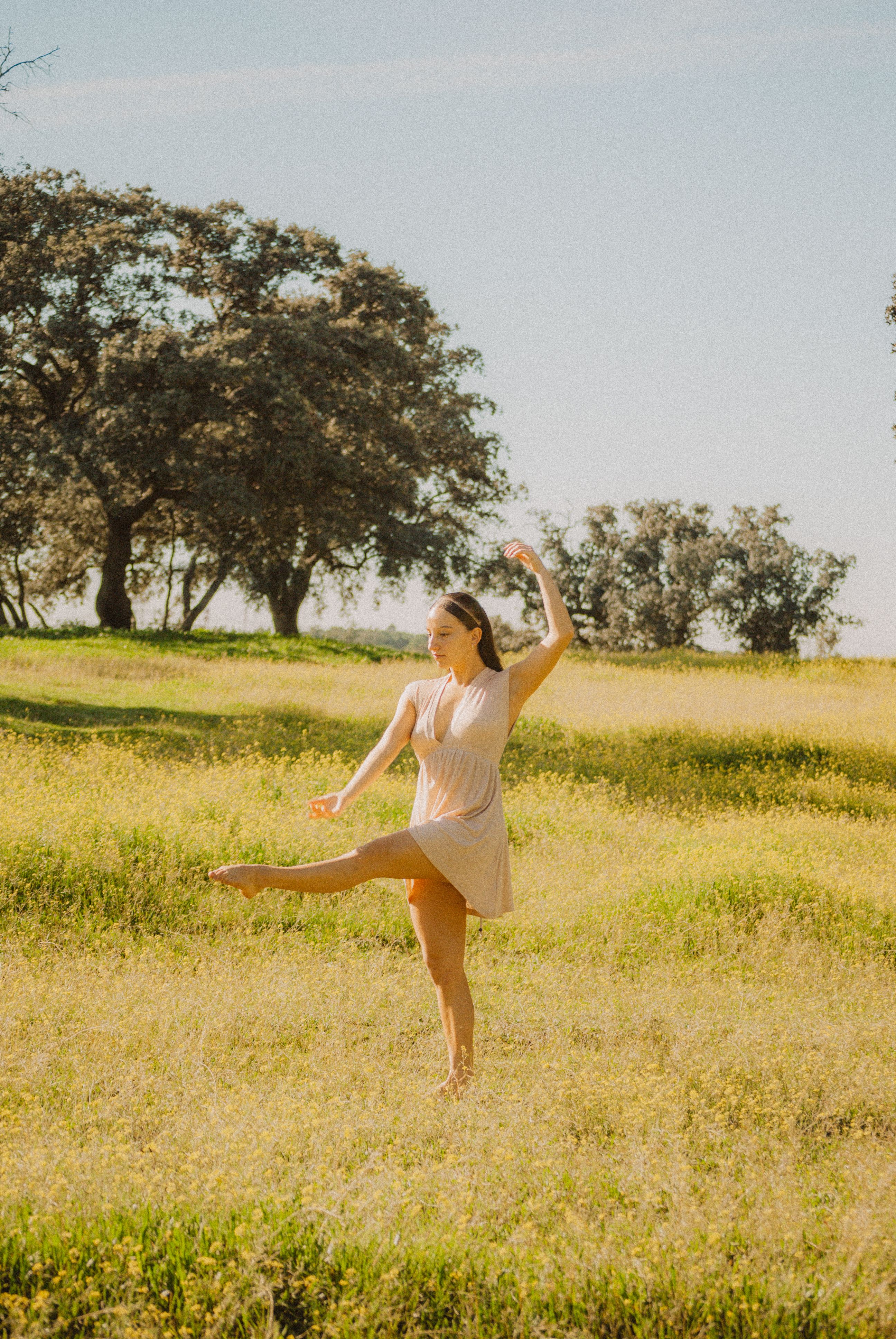Woman Dancing in a Meadow · Free Stock Photo