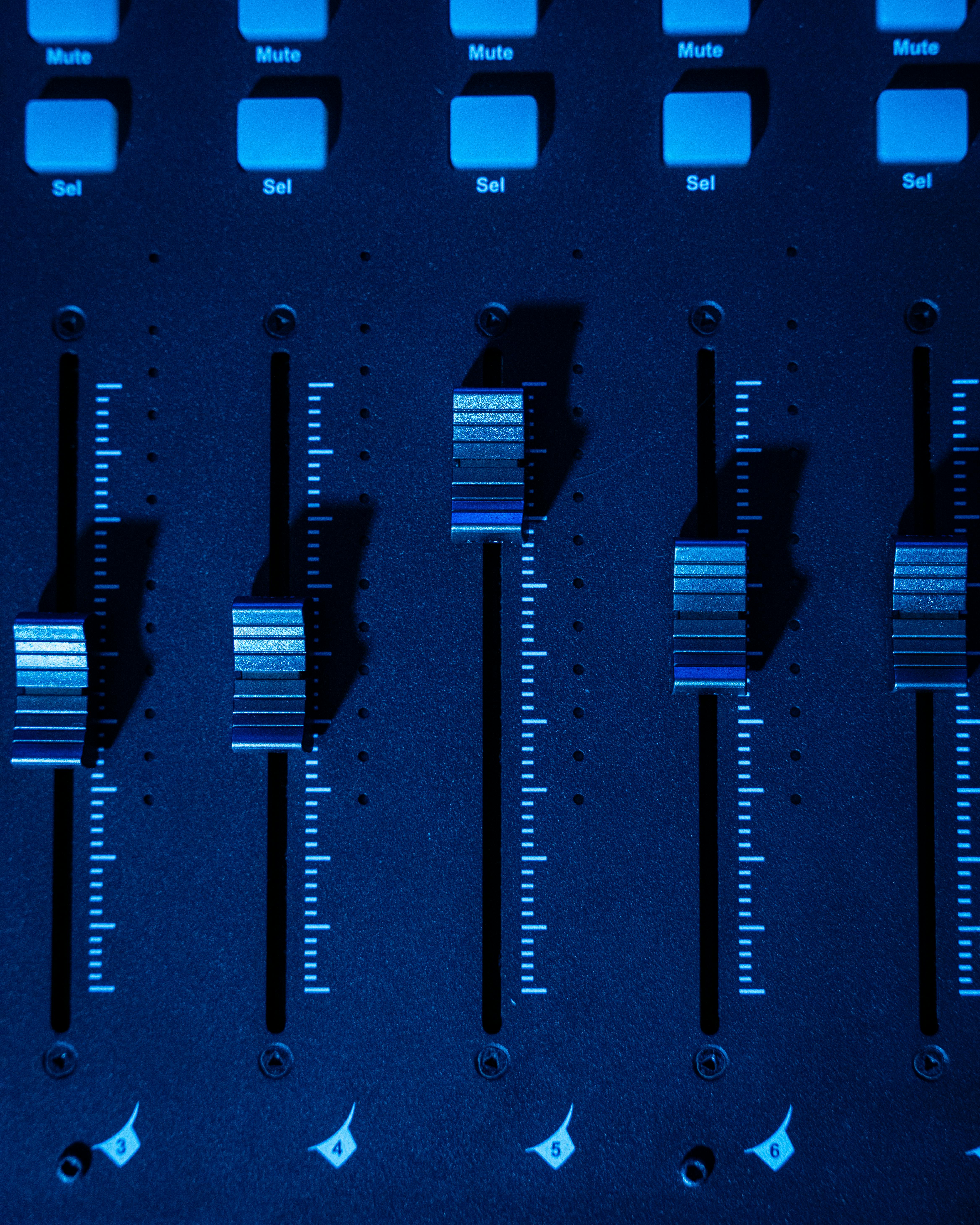 Close view of a mixer faders in a recording studio at Orbital 101 ...