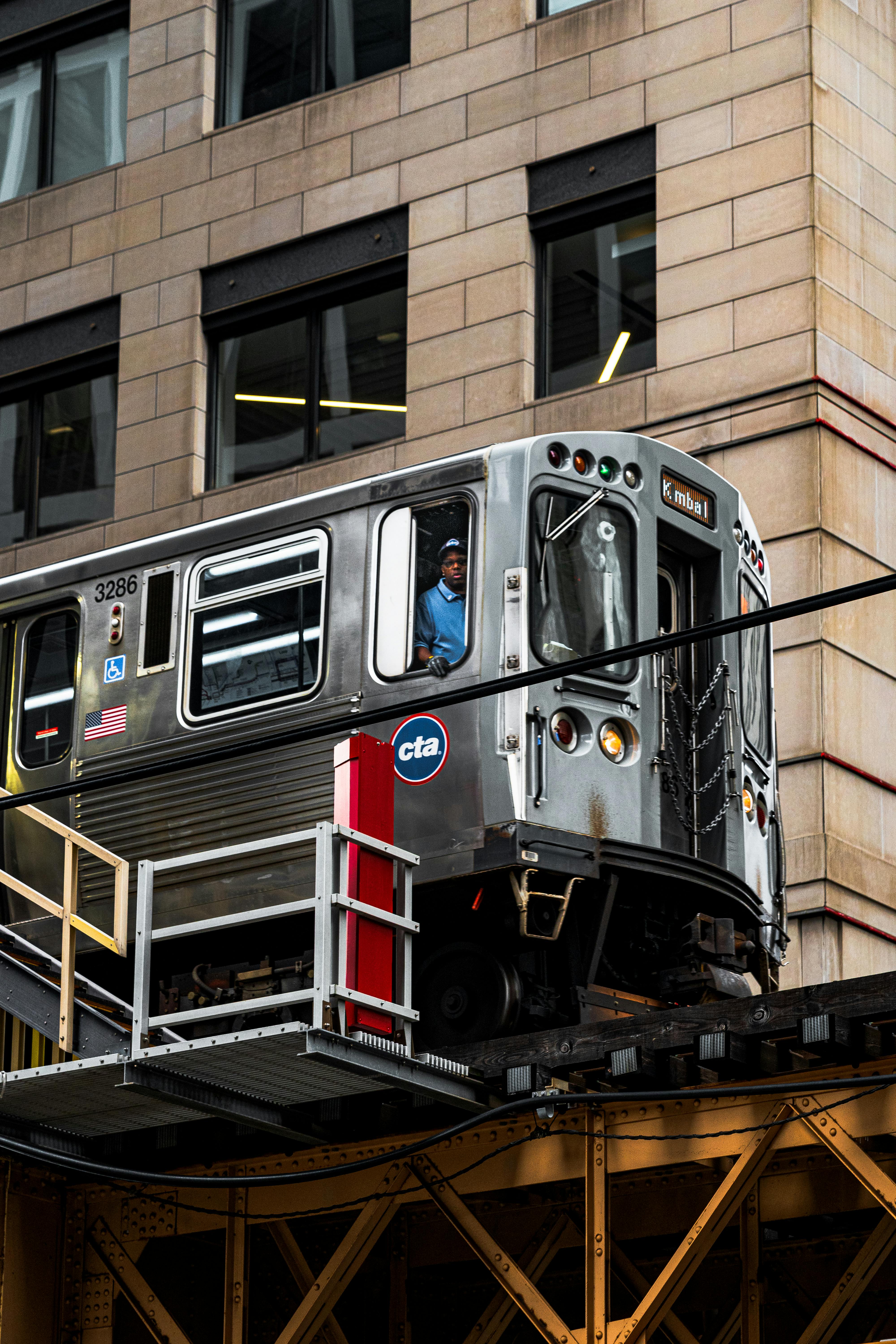 CTA Conductor operating L Train · Free Stock Photo
