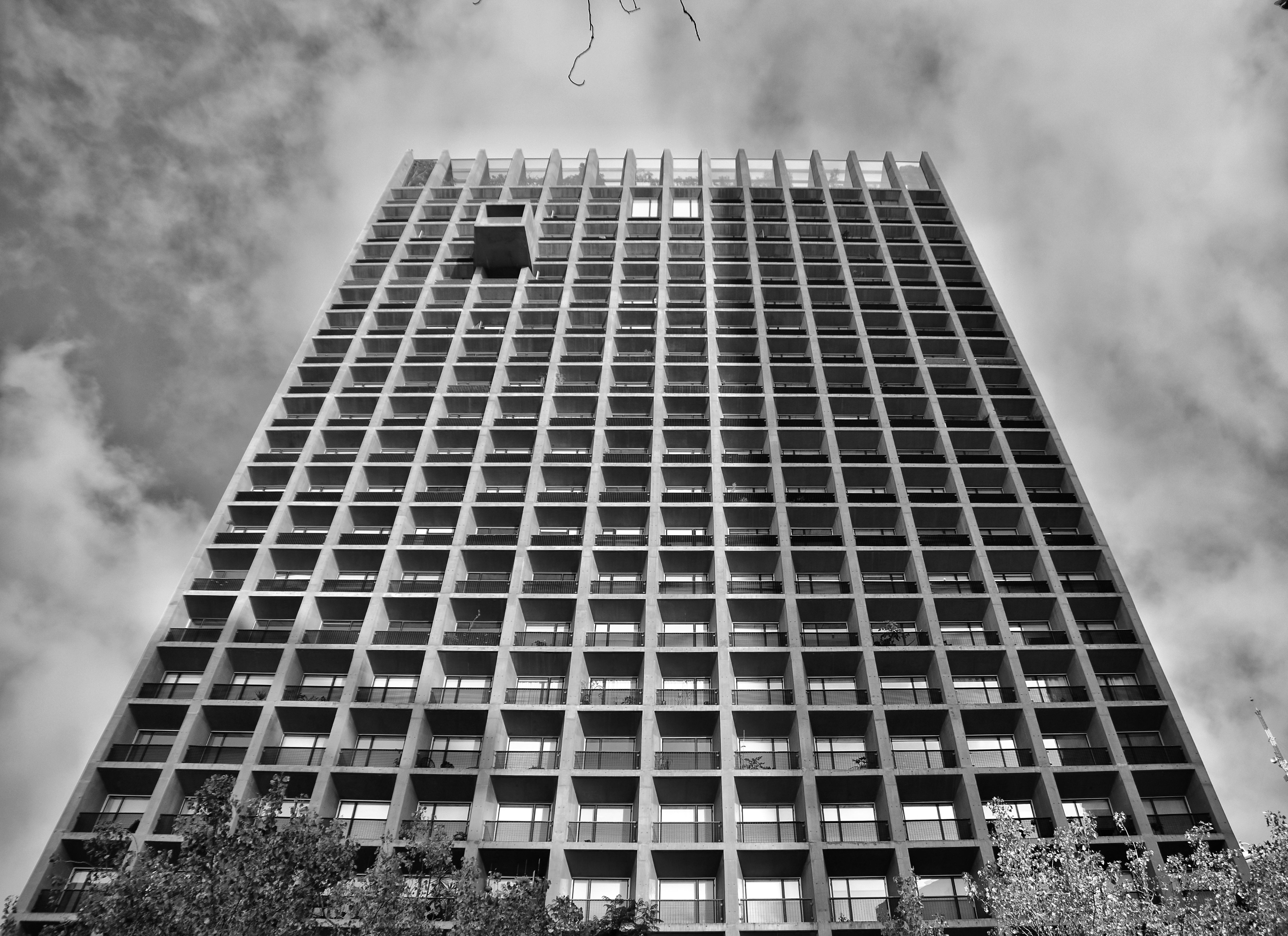 Low Angle Shot of a Modern Skyscraper in a City · Free Stock Photo