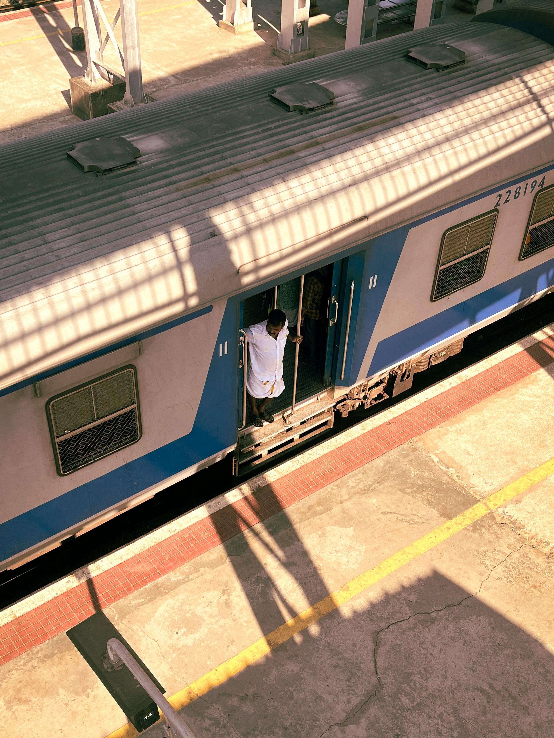 Aerial View of a Passenger Train at the Station · Free Stock Photo