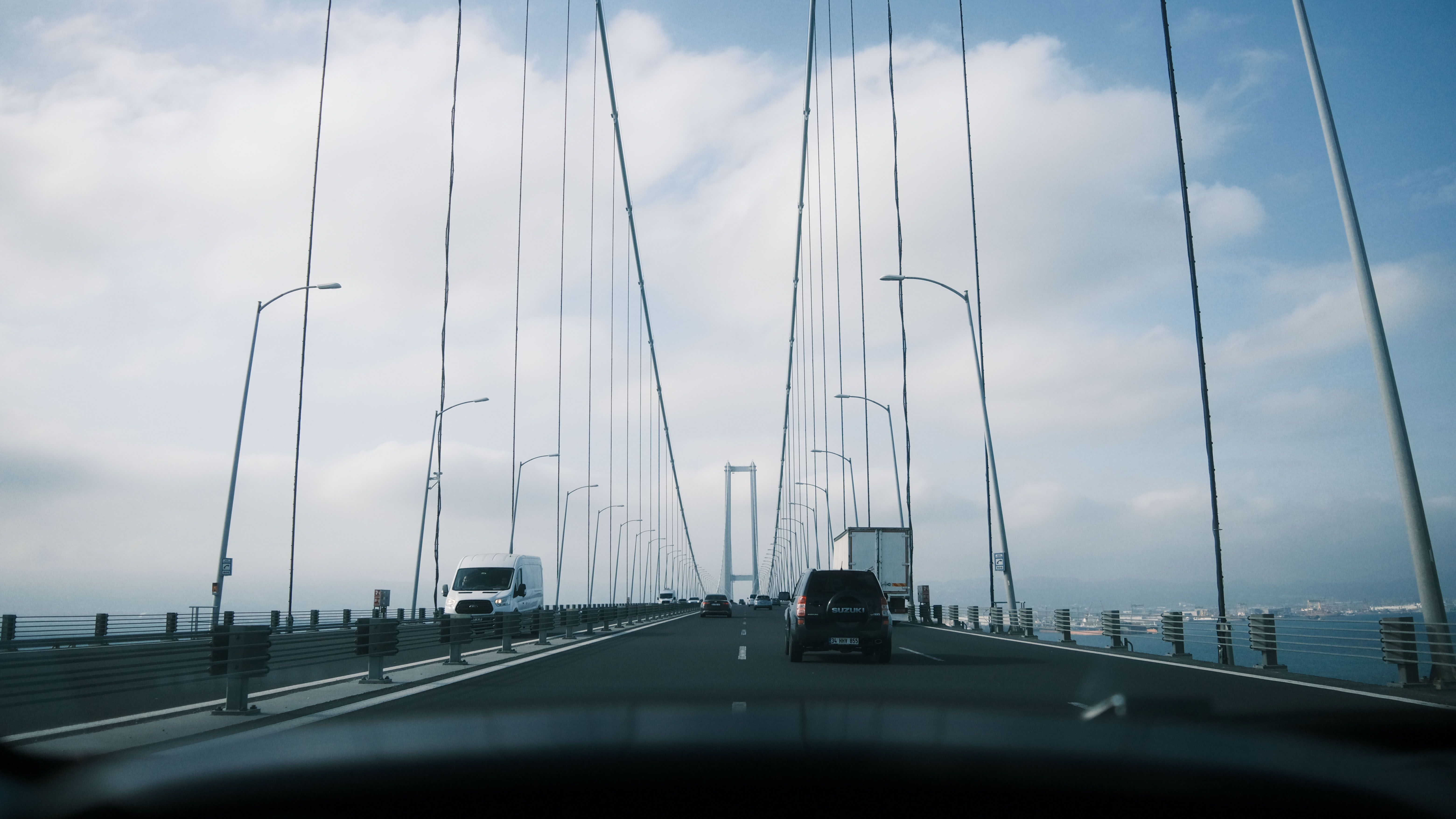 A view from inside a car driving on a bridge · Free Stock Photo