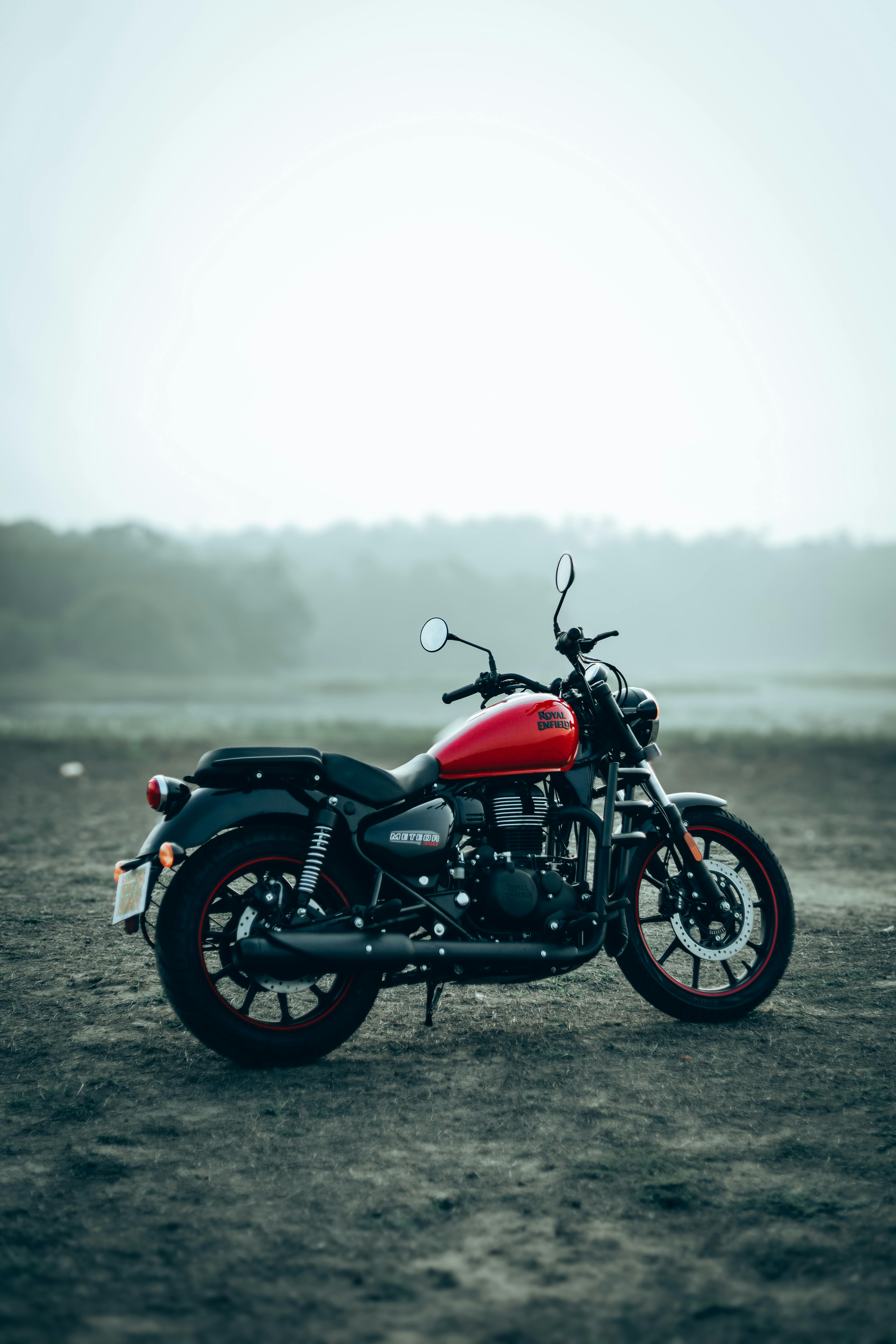 Black Backbone Motorcycle Near Man in Blue Shirt at Daytime · Free ...