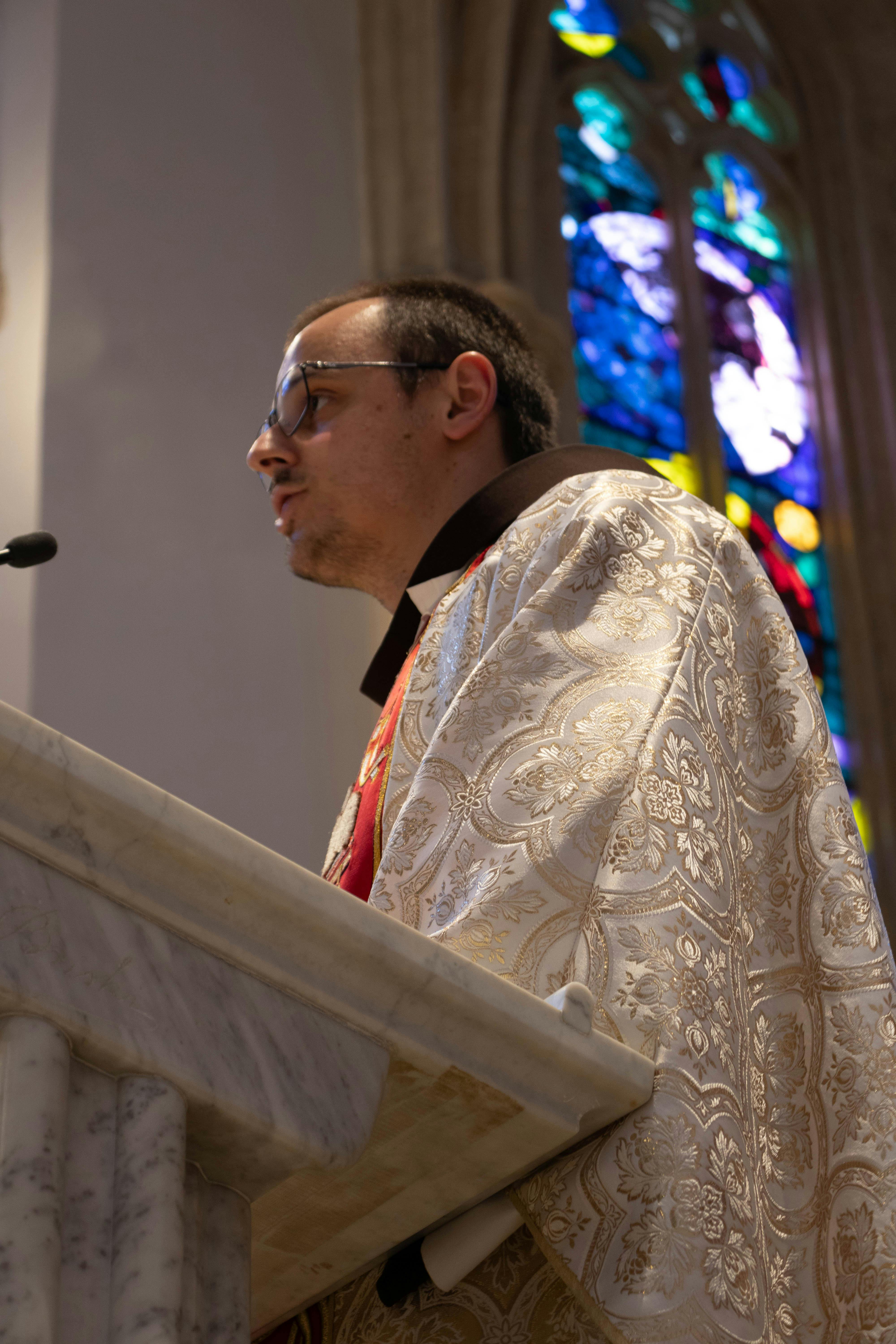 Priest at Pulpit During Mass in Church · Free Stock Photo