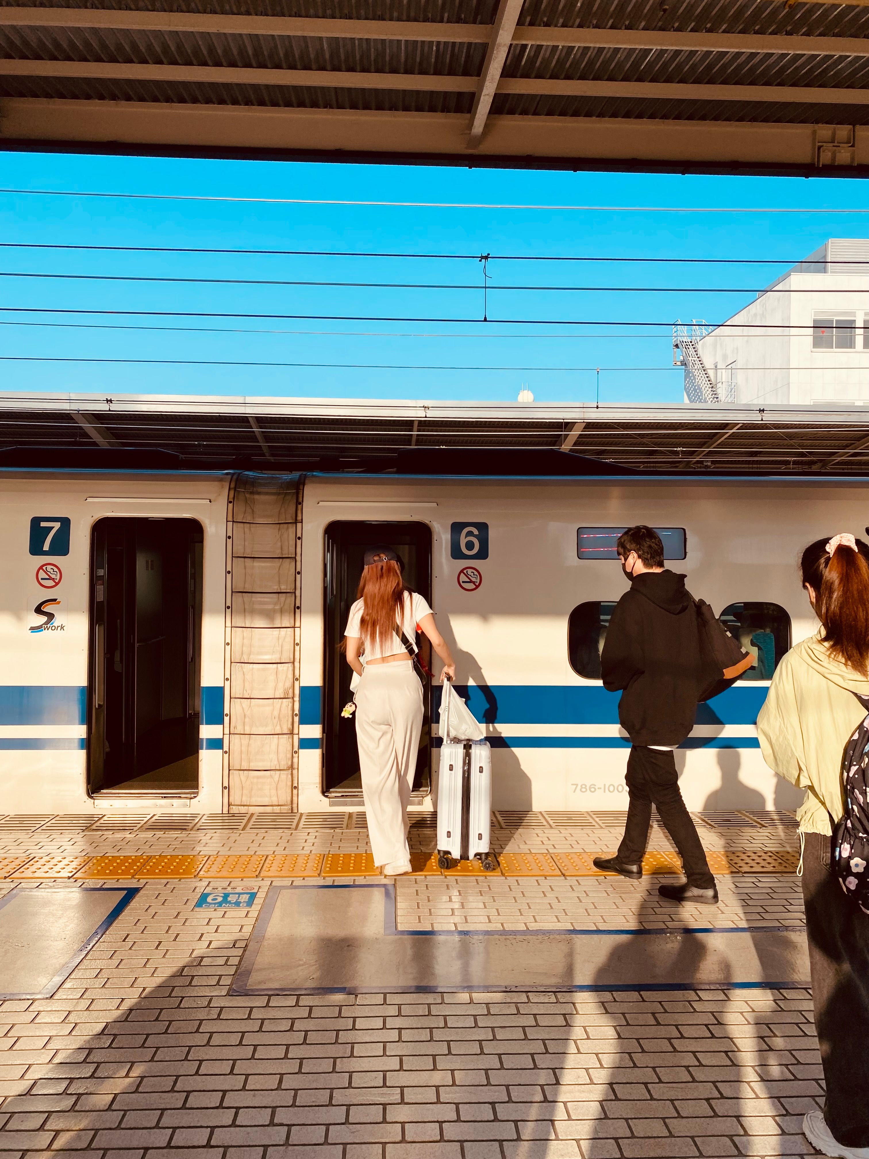 Passengers Boarding a Train · Free Stock Photo