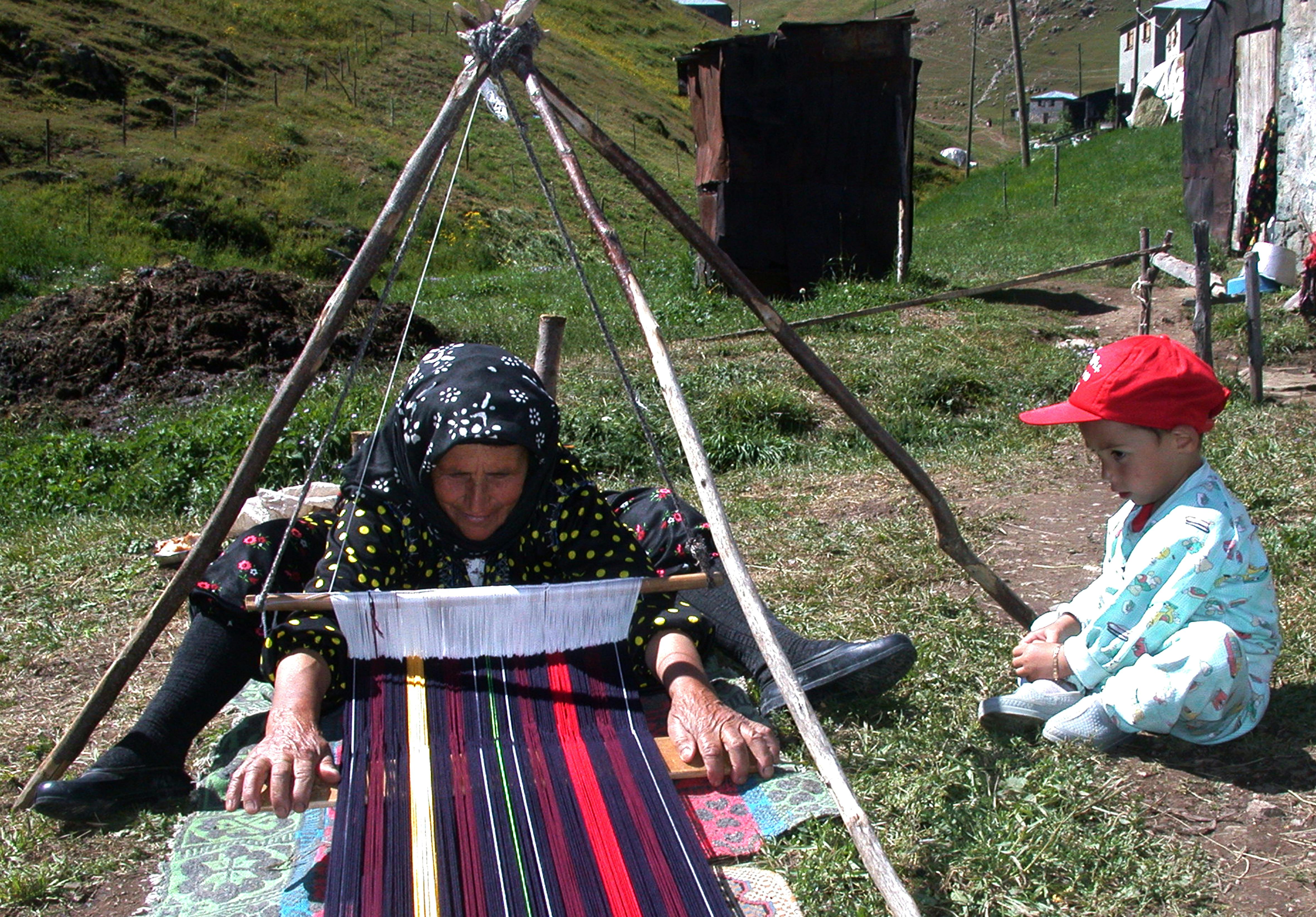 Woman Weaving Cloth · Free Stock Photo
