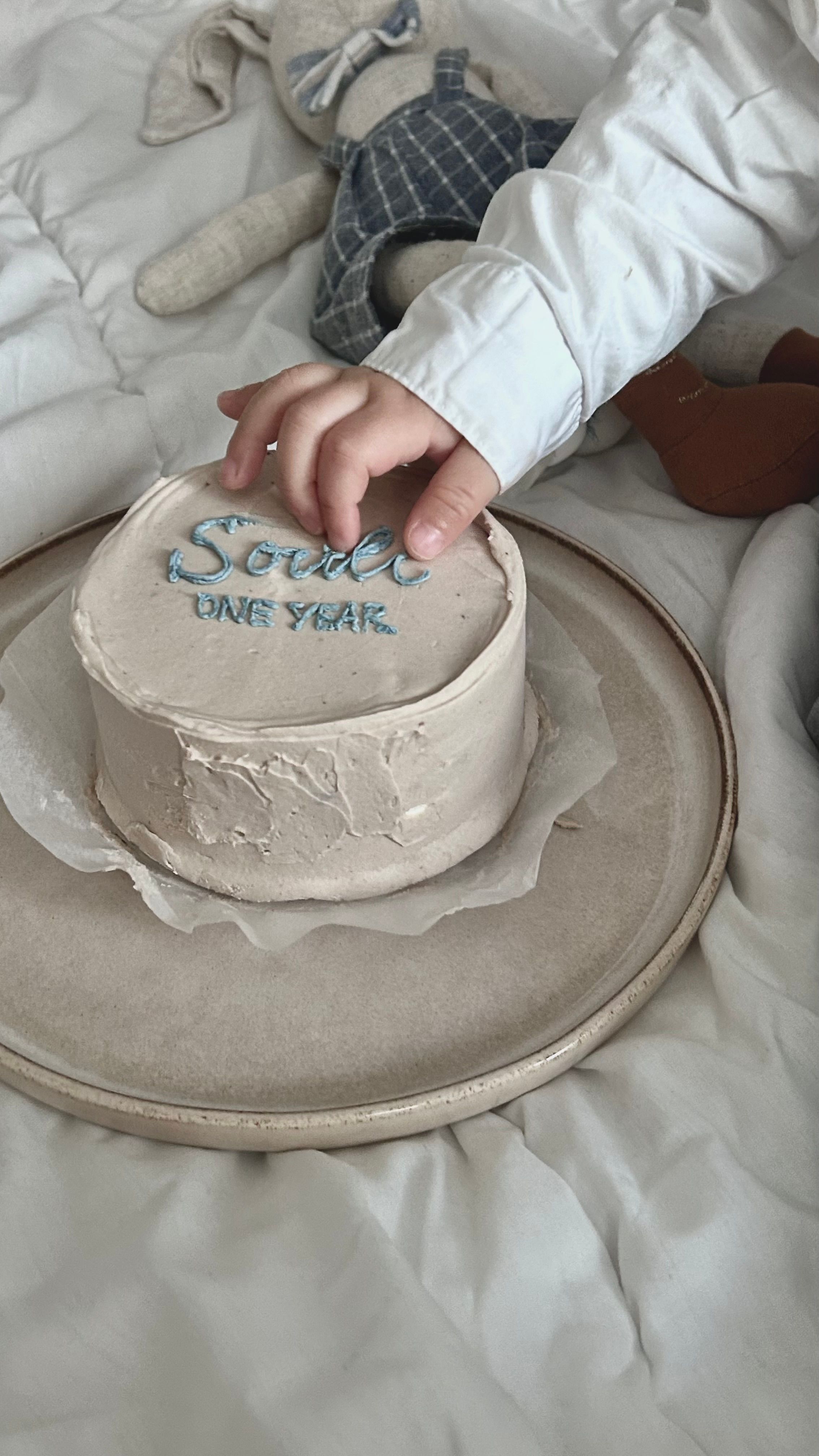 Child Hand over Birthday Cake · Free Stock Photo