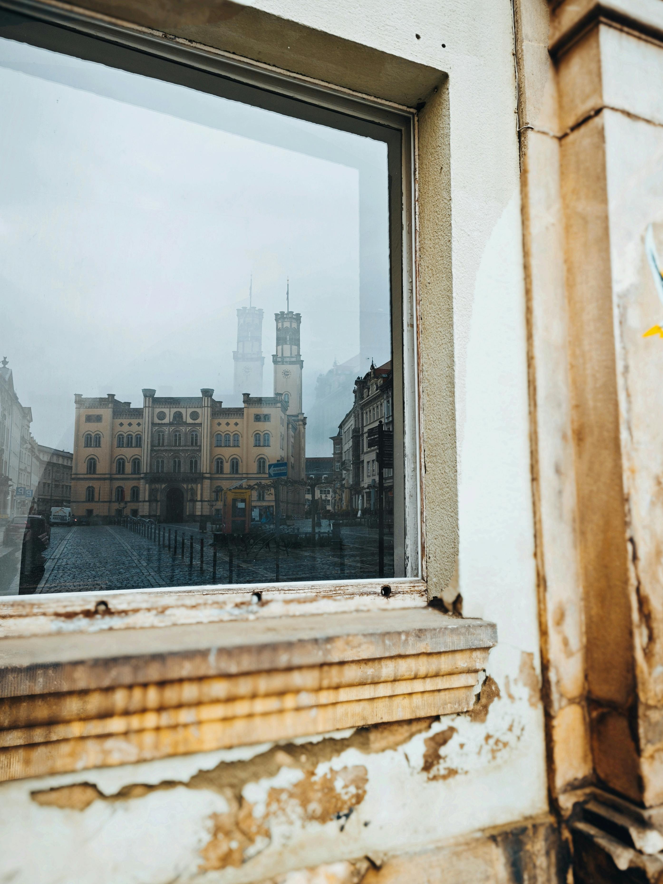 Zittau Market Square Reflecting in a Window · Free Stock Photo