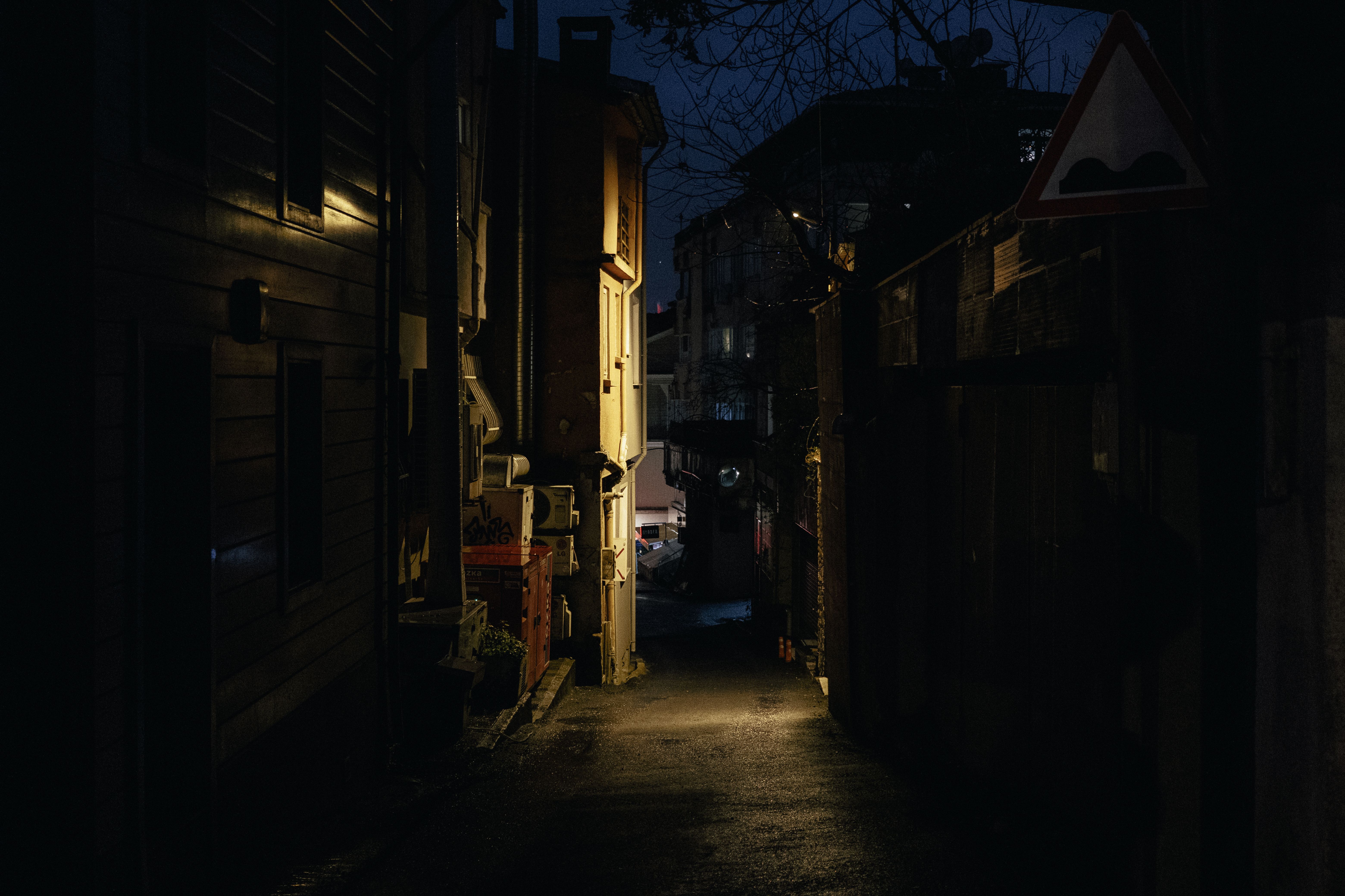 A Dark, Narrow Alley in a City at Night · Free Stock Photo