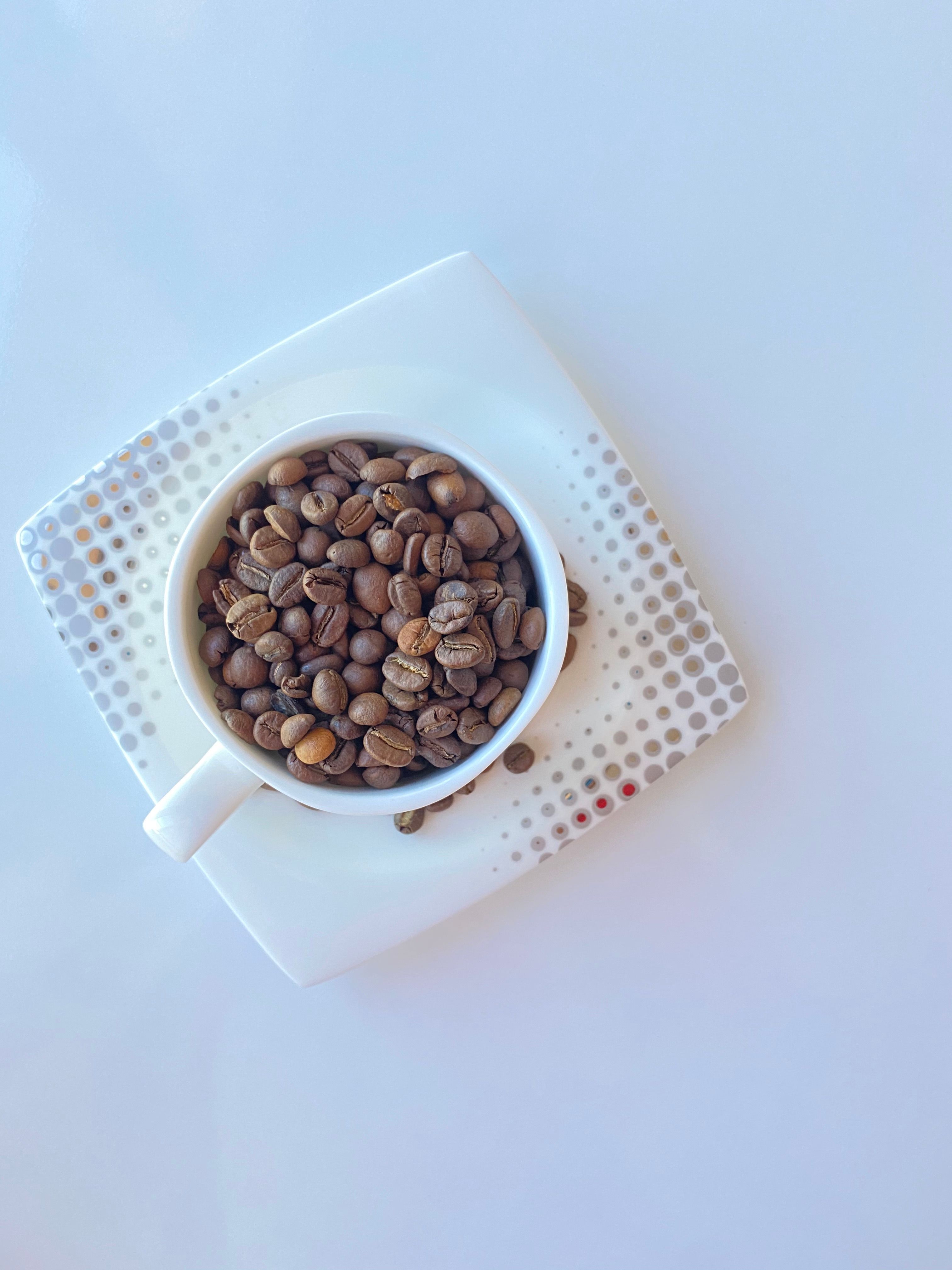 Coffee in Drinking Glass With Black Beans · Free Stock Photo