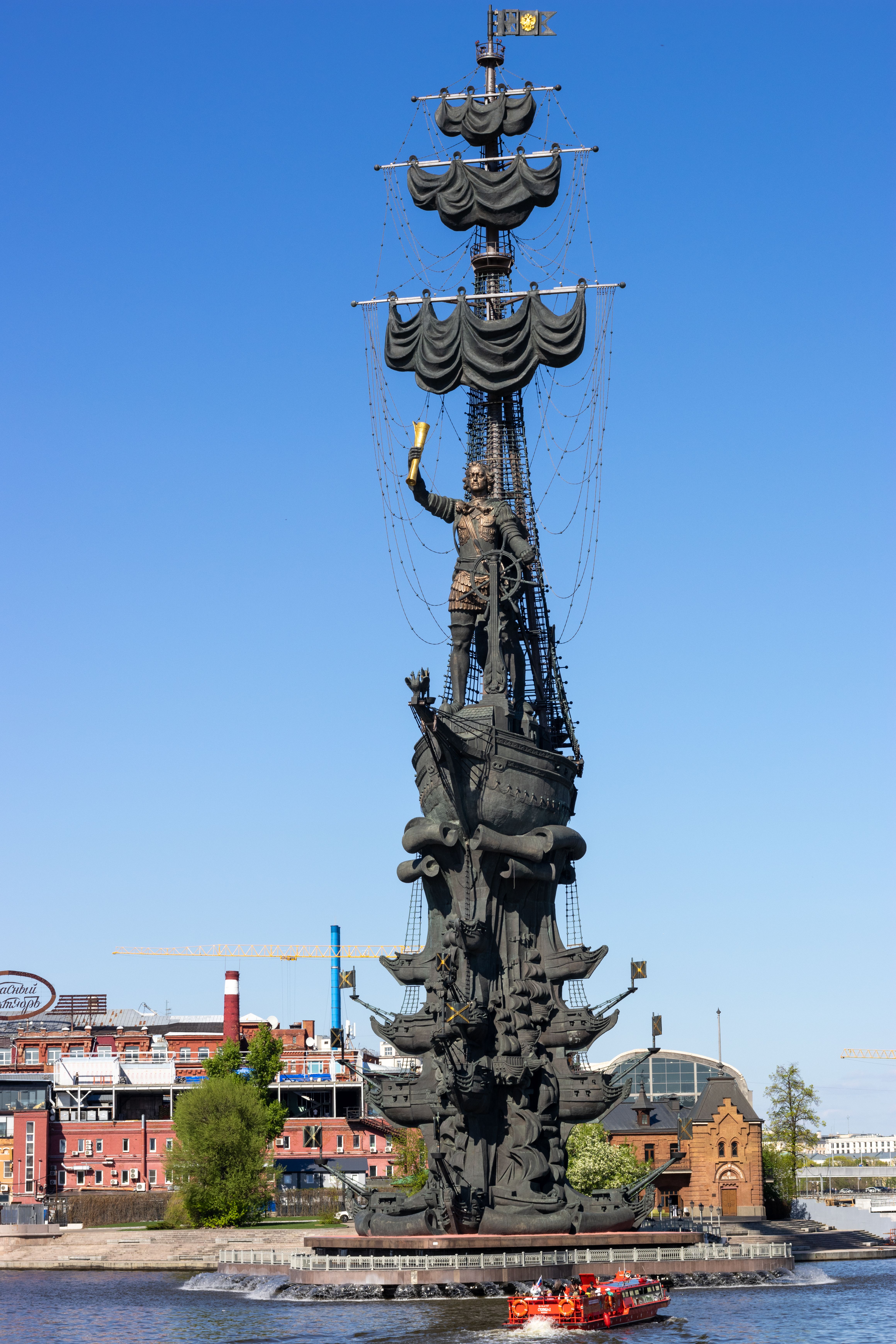 A statue of a pirate ship in the water · Free Stock Photo