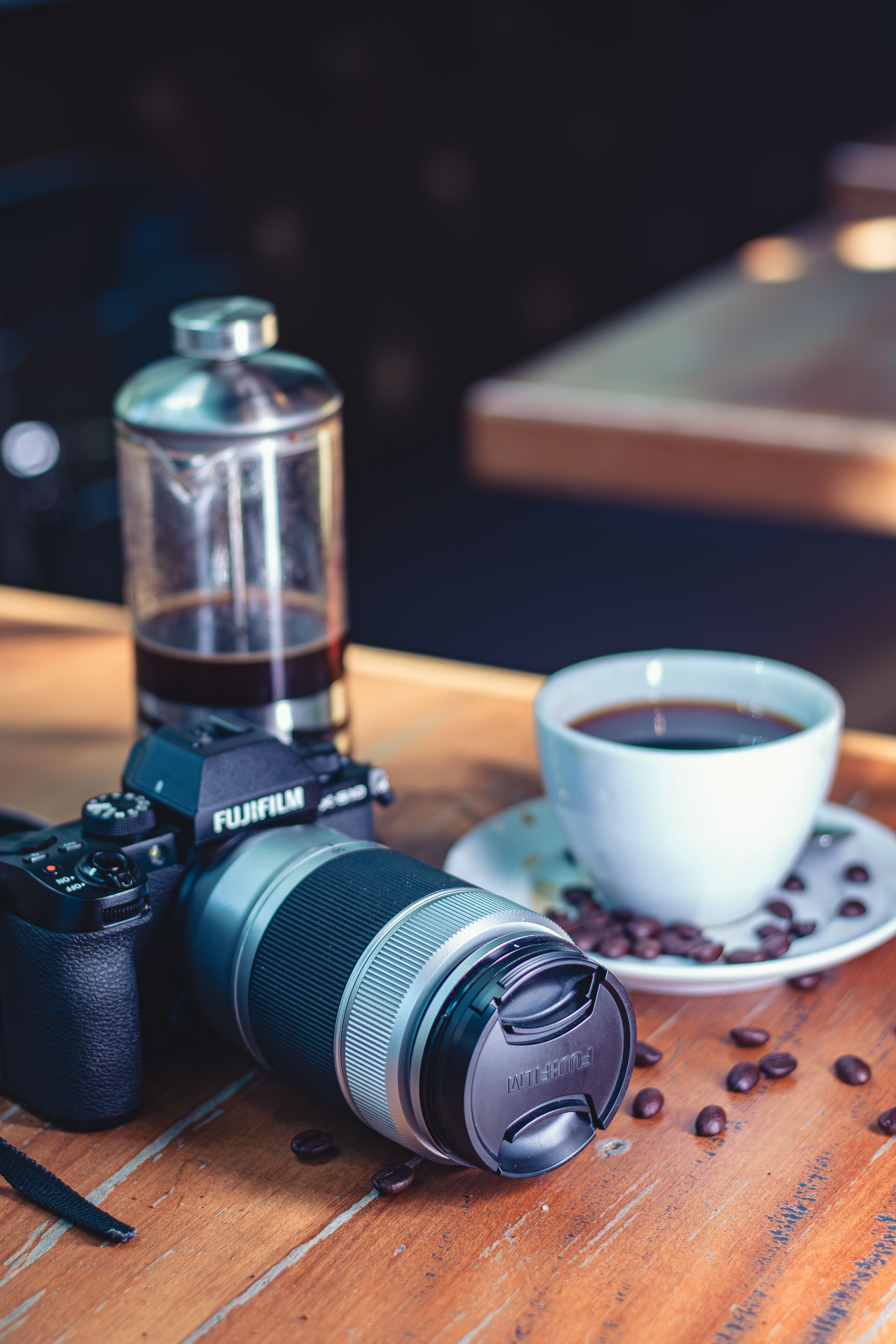 A Coffee and a Camera on a Table · Free Stock Photo