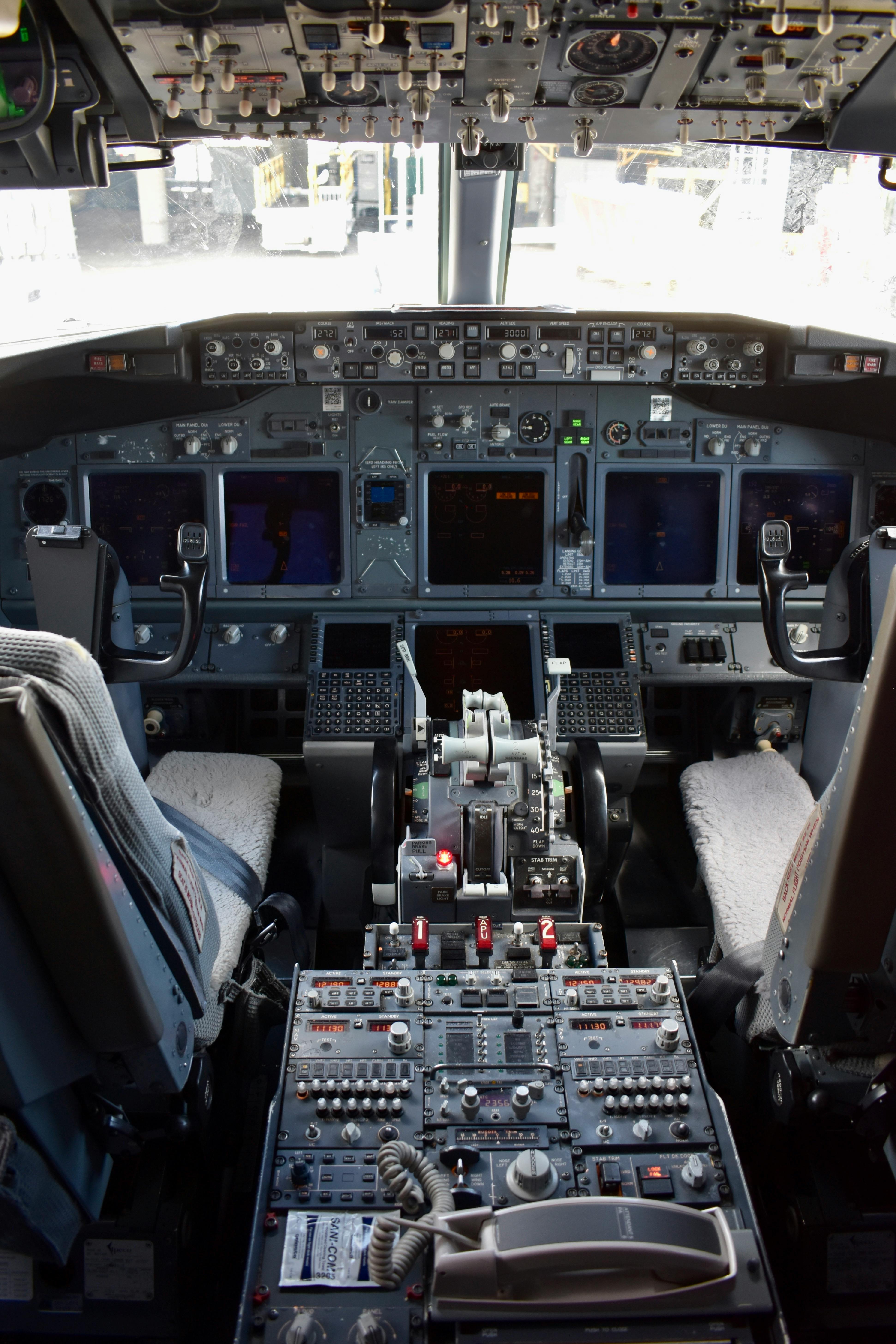 Interior of the Pilots Cabin in a Plane · Free Stock Photo