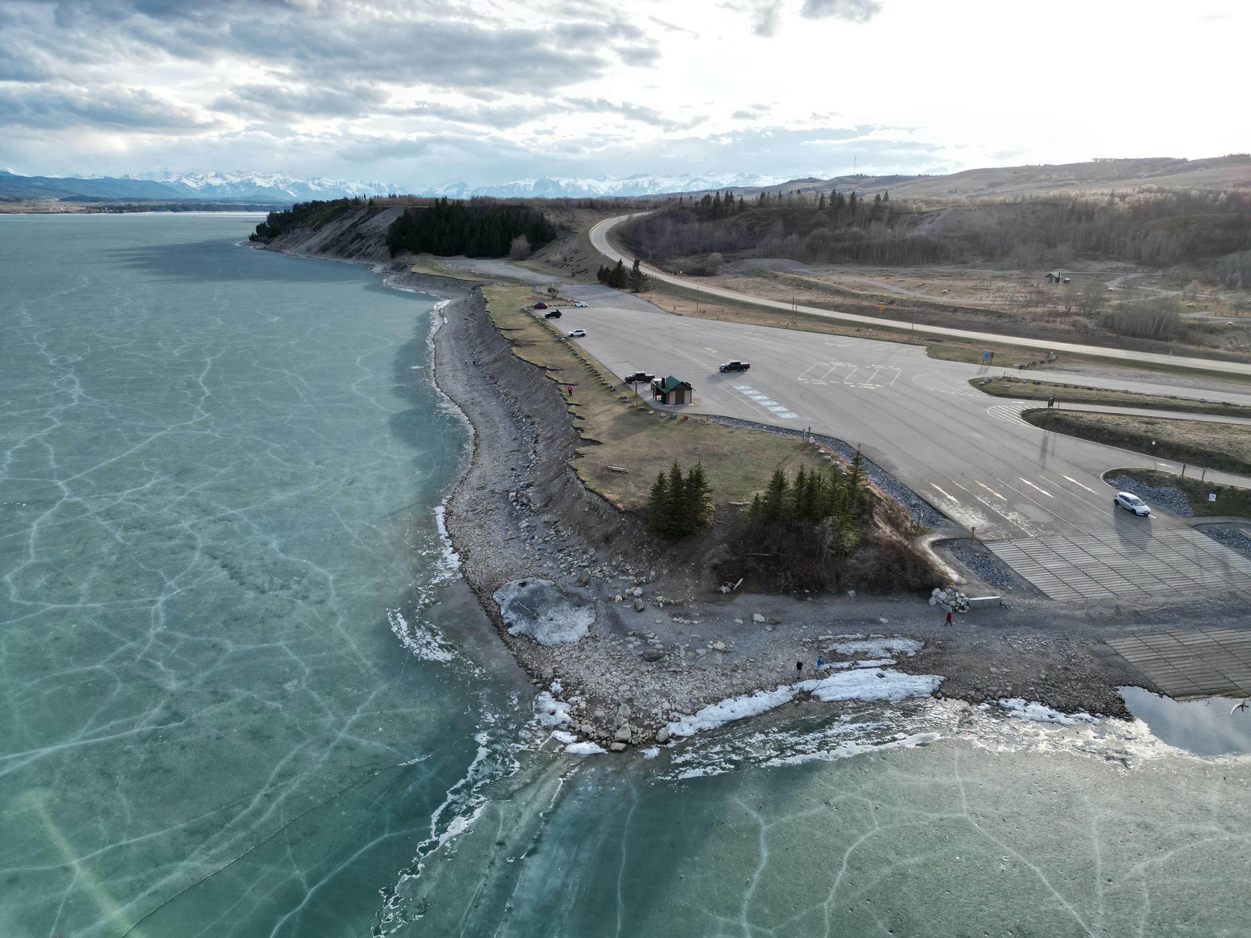 Road and Parking Lot by Lake in Countryside · Free Stock Photo
