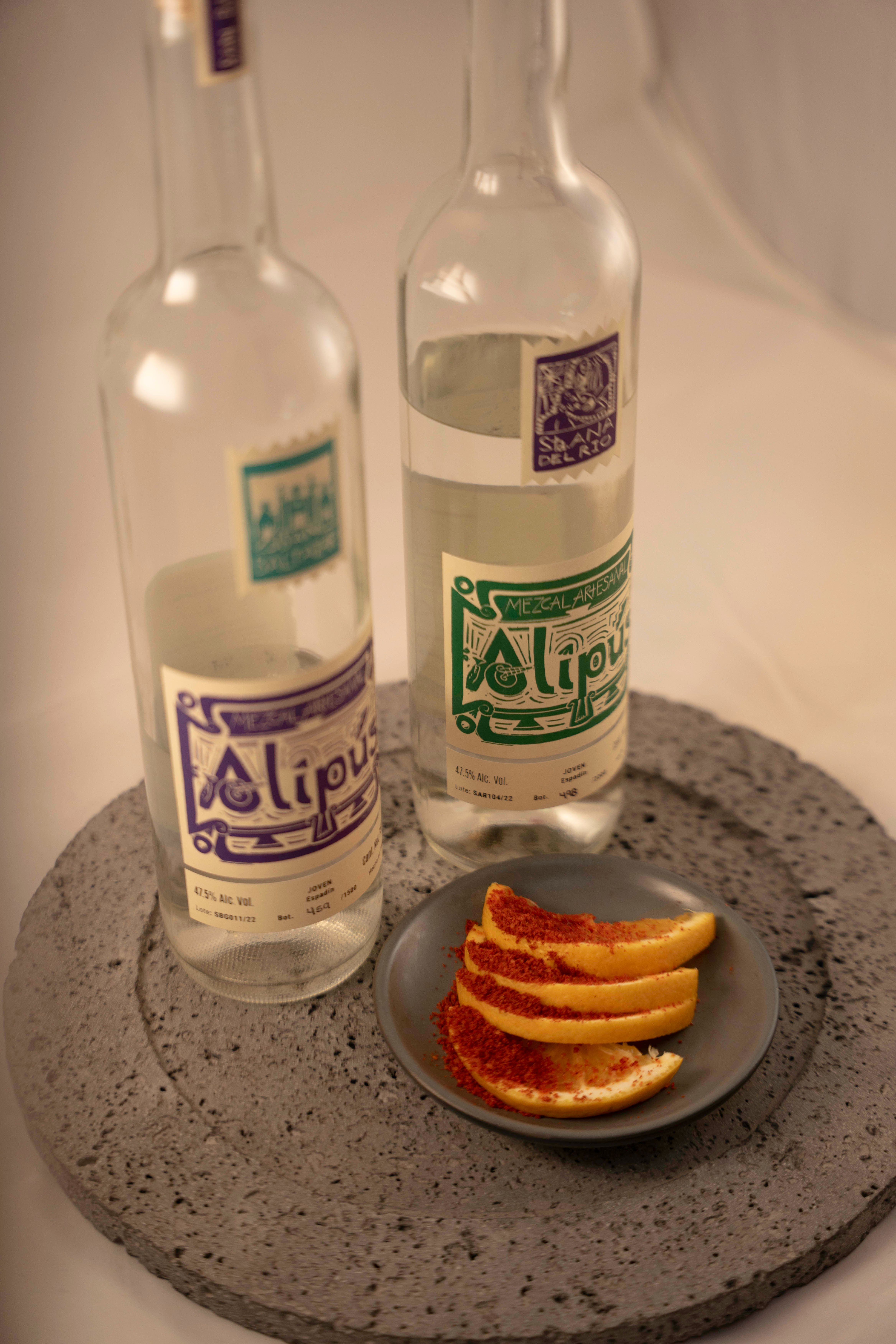 Bottles of Vodka on Plate · Free Stock Photo
