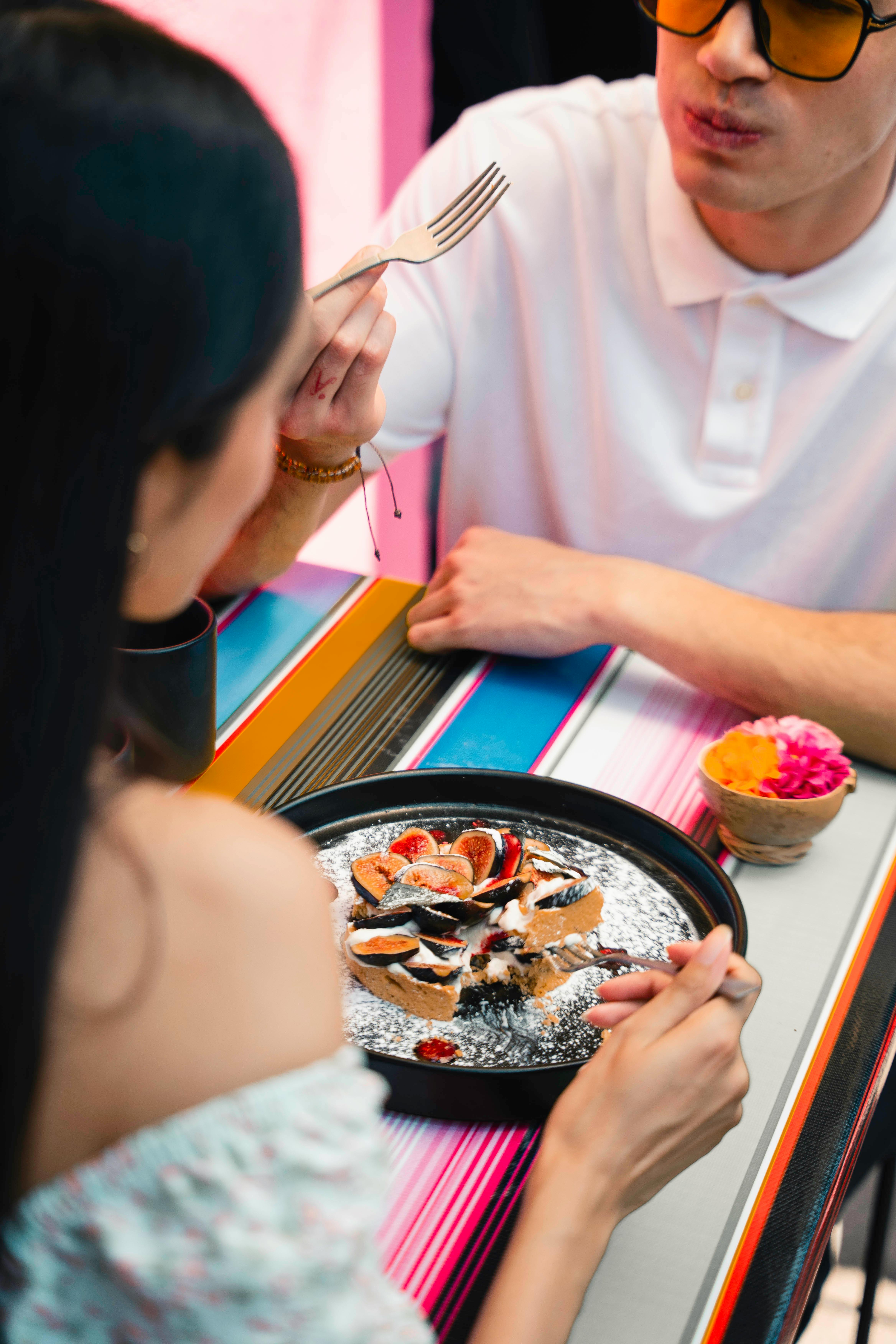 Couple Eating Seafood in a Restaurant · Free Stock Photo