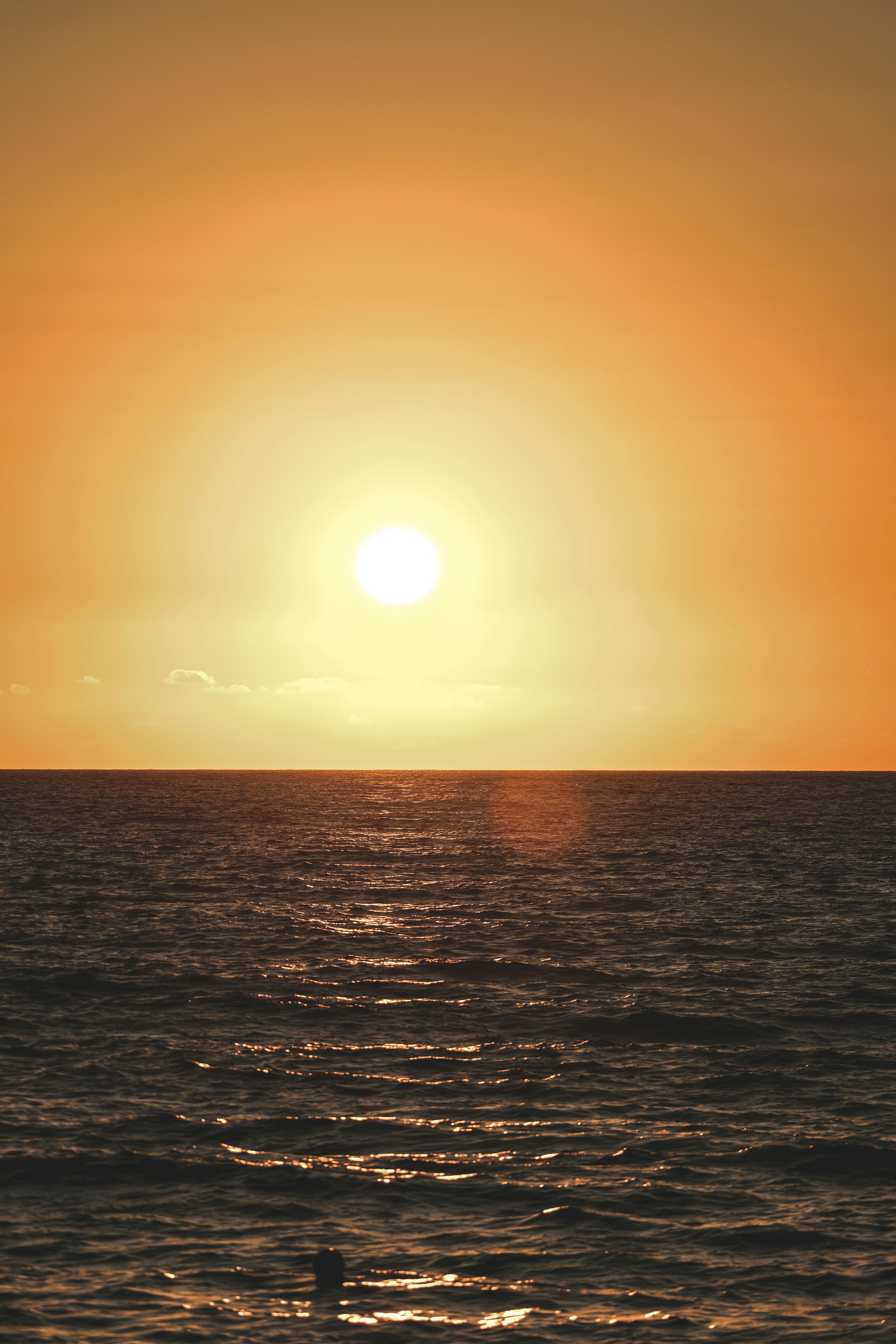 Sun over Ocean at Sunset · Free Stock Photo