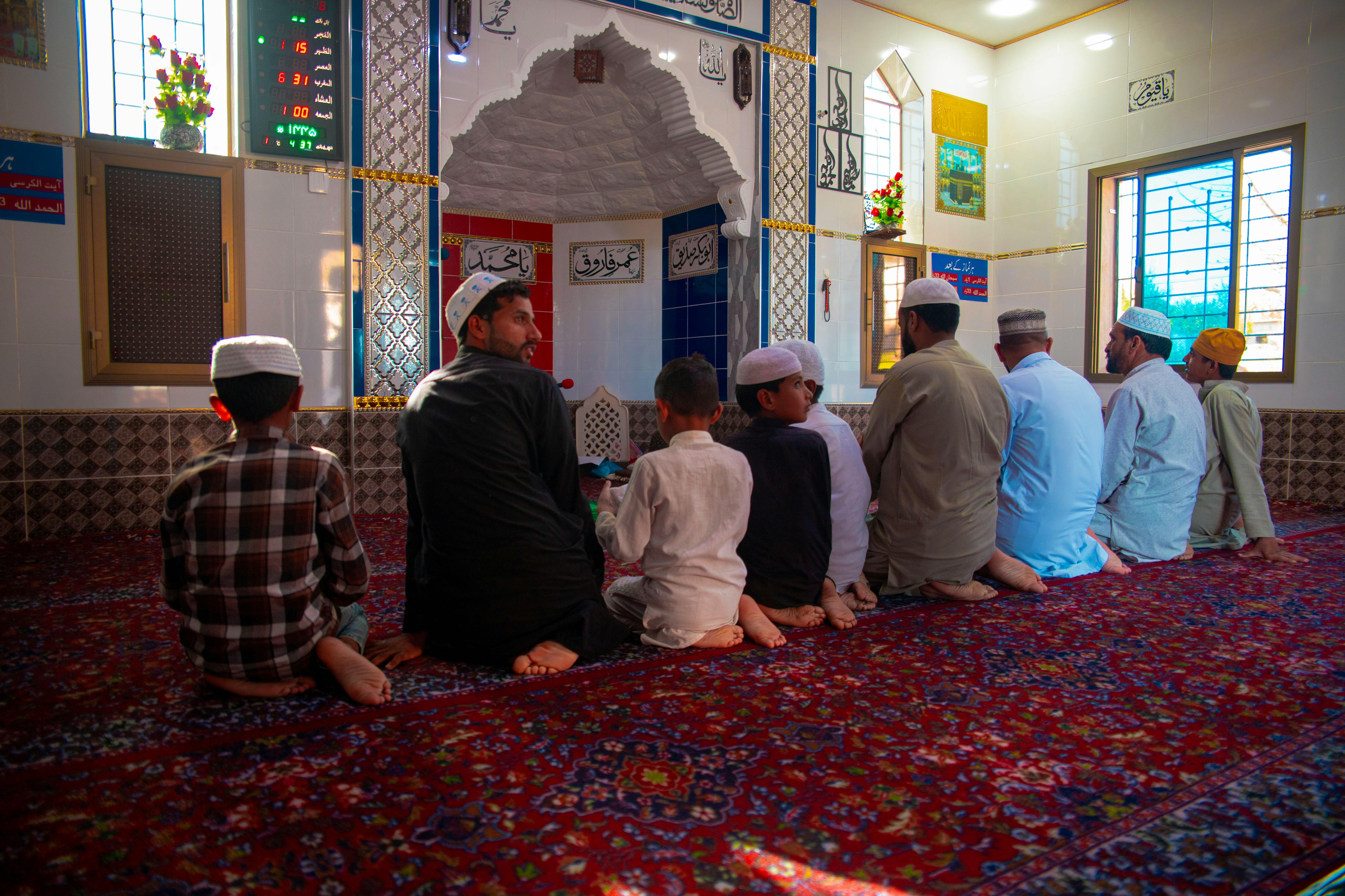 Men and Boys Praying at Mosque · Free Stock Photo