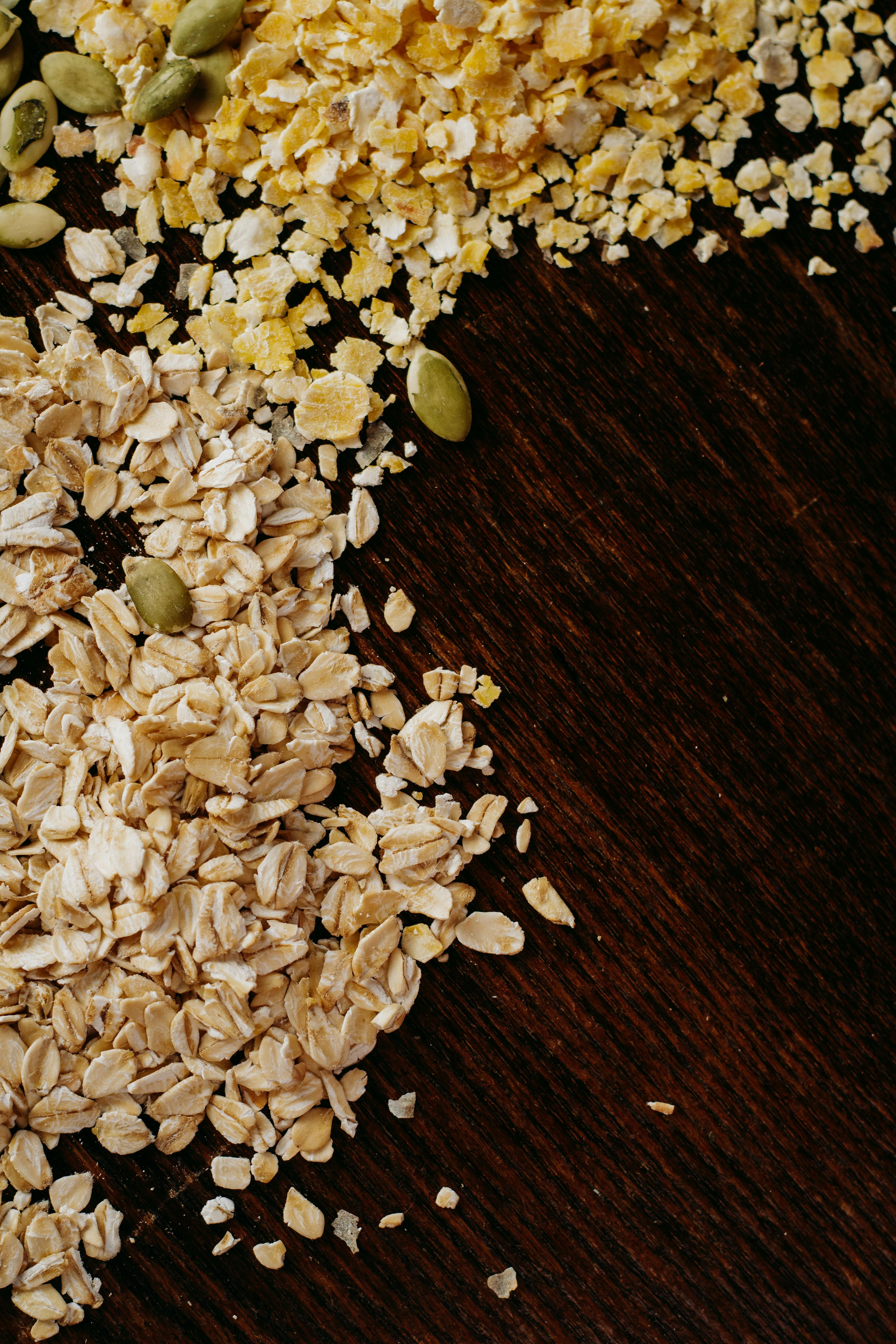 Seeds on Brown Panel · Free Stock Photo