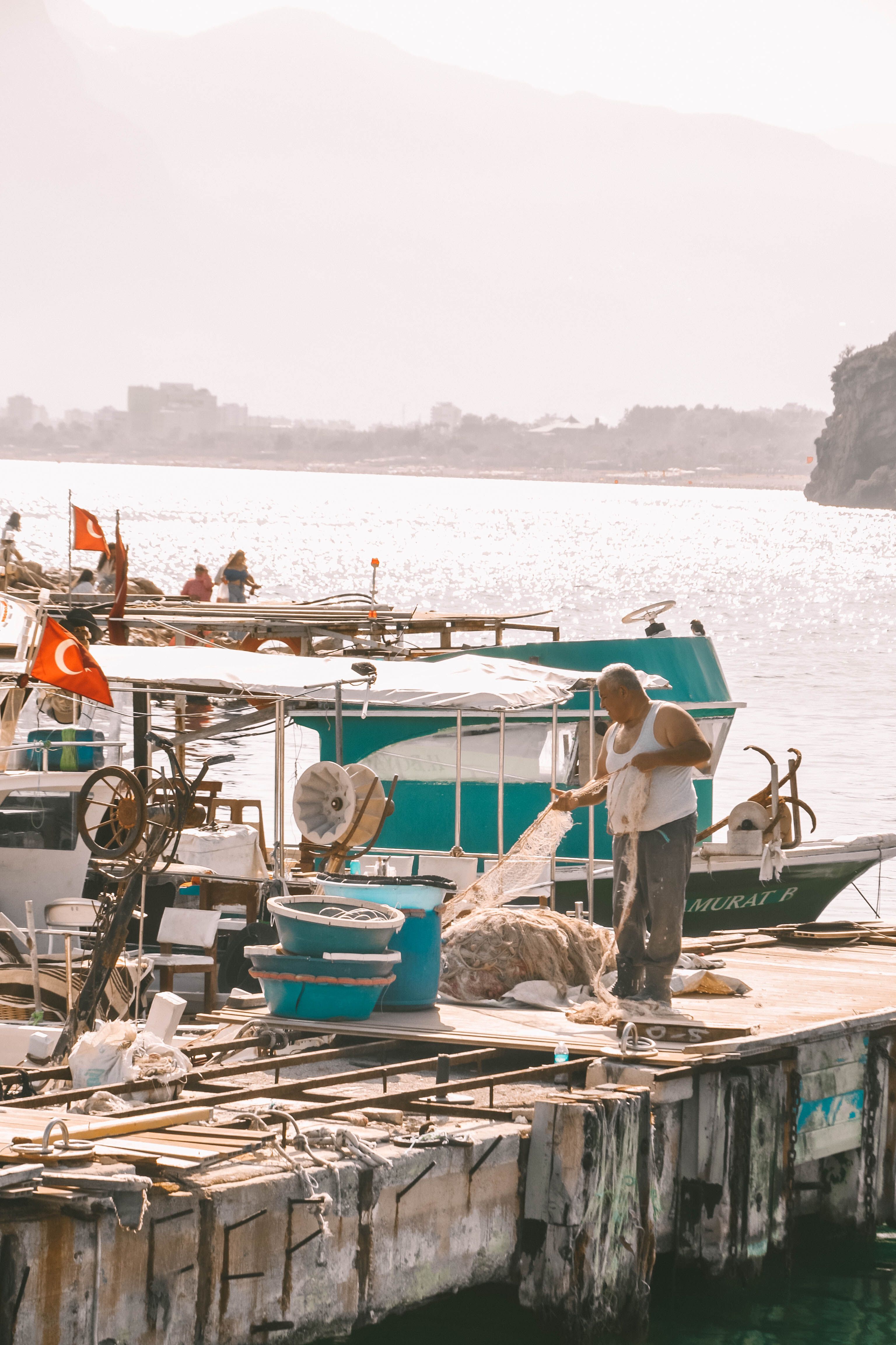Man in a Harbor · Free Stock Photo