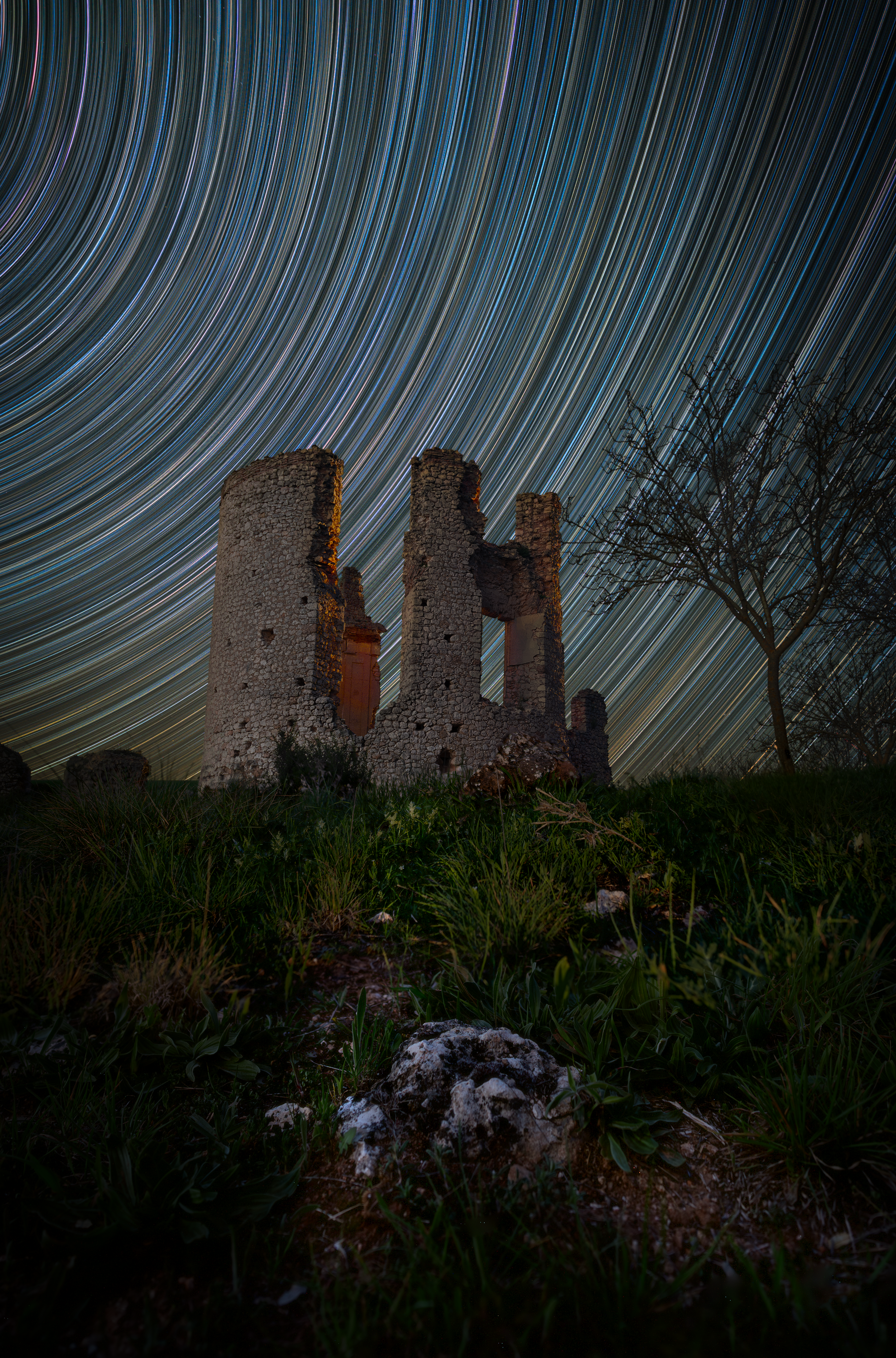 Lights on Night Sky over Ruins in Countryside · Free Stock Photo