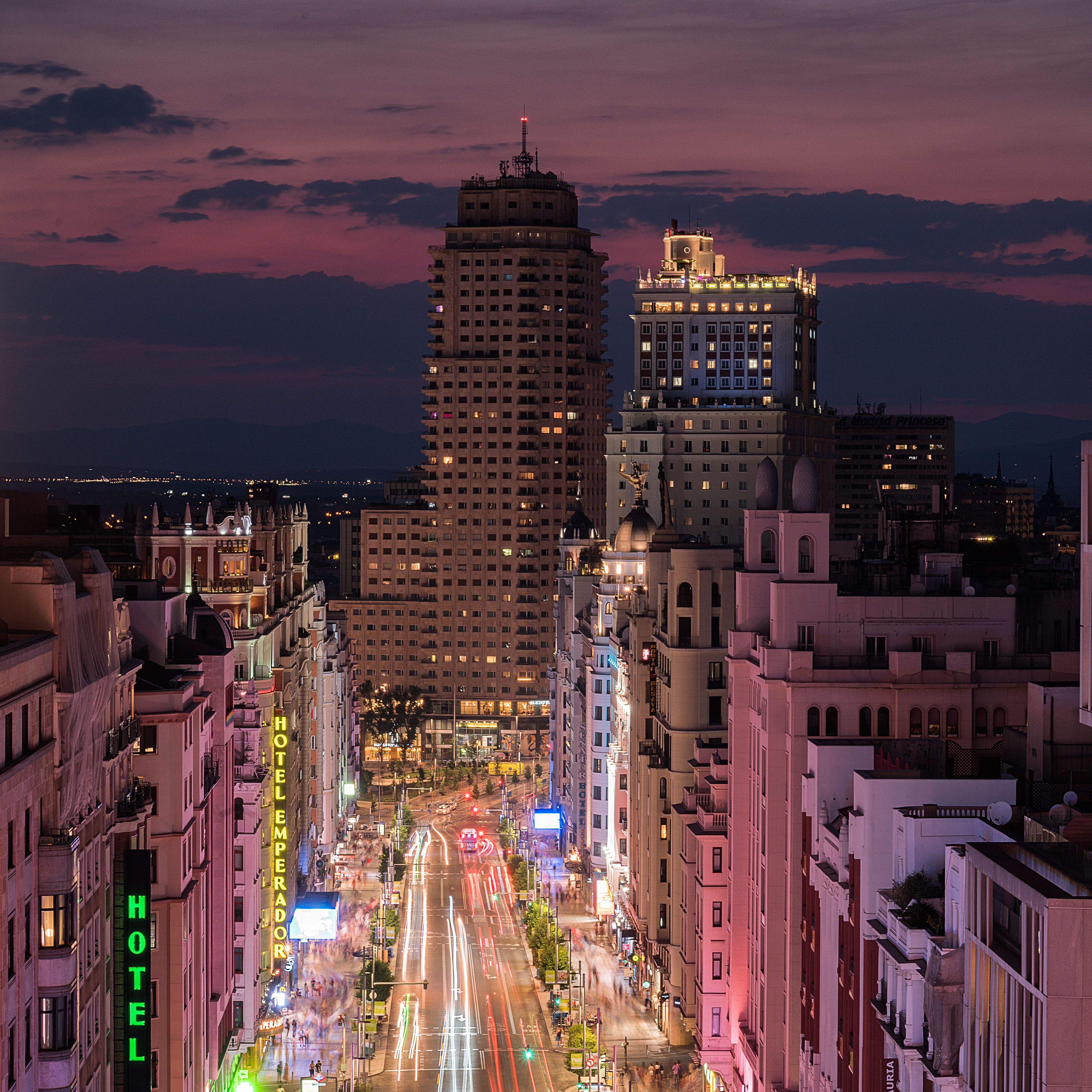 Buildings around Illuminated Street in Madrid at Night · Free Stock Photo