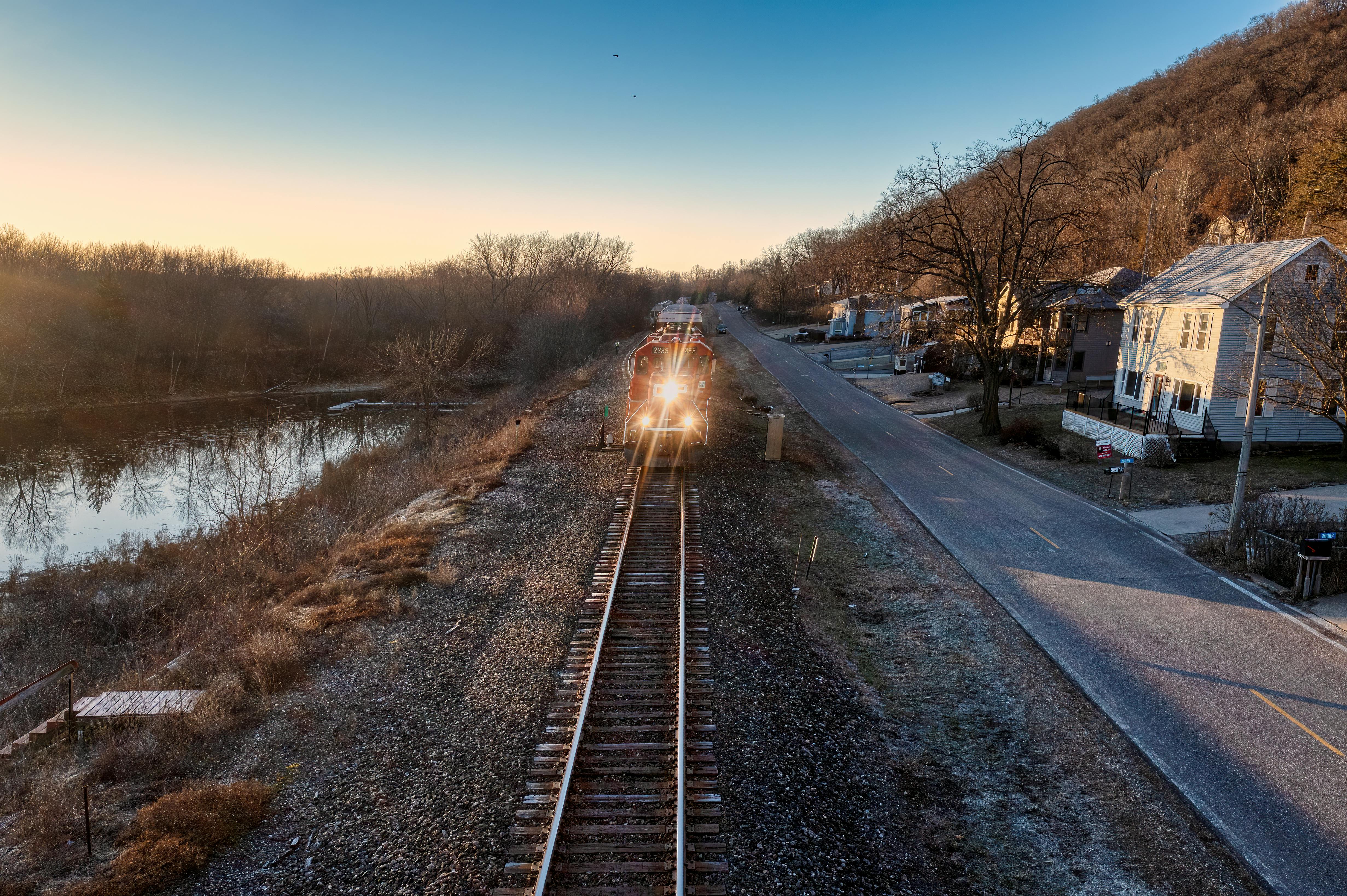 Train Riding on Railway Tracks in a Rural Area · Free Stock Photo