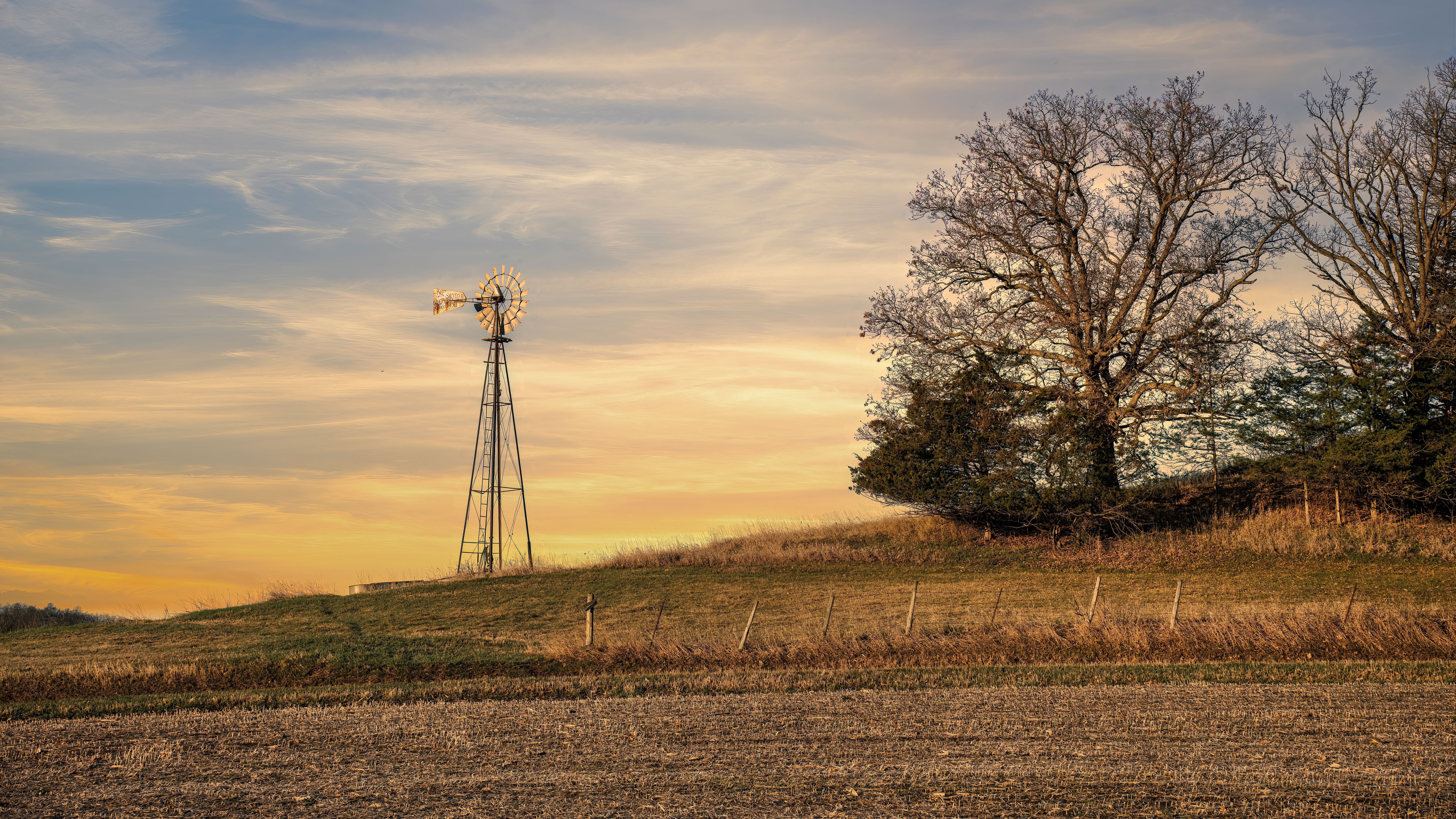 Charming Rural Landscape with a Windmill · Free Stock Photo