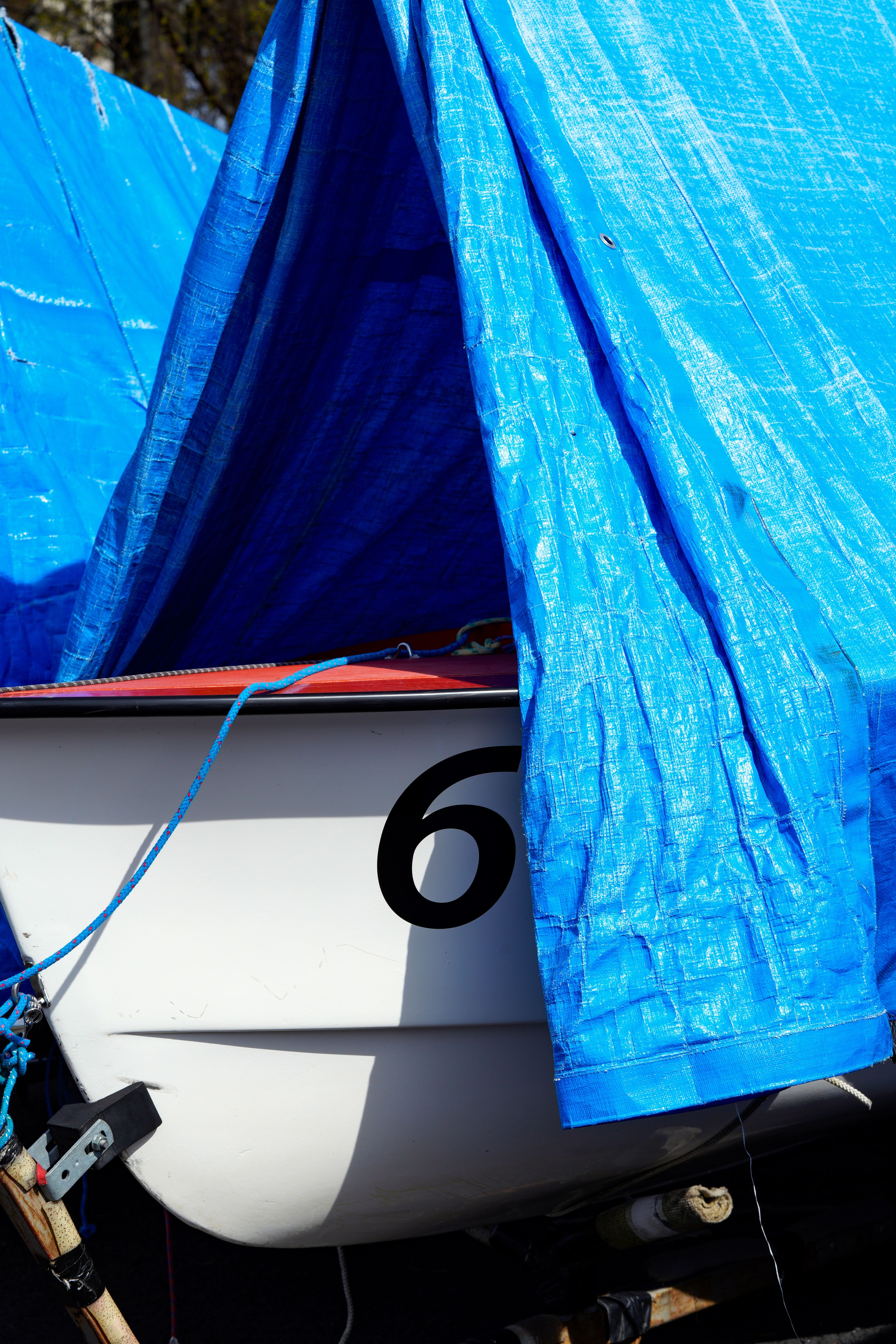 Boat Number Six Covered with Blue Tarps · Free Stock Photo