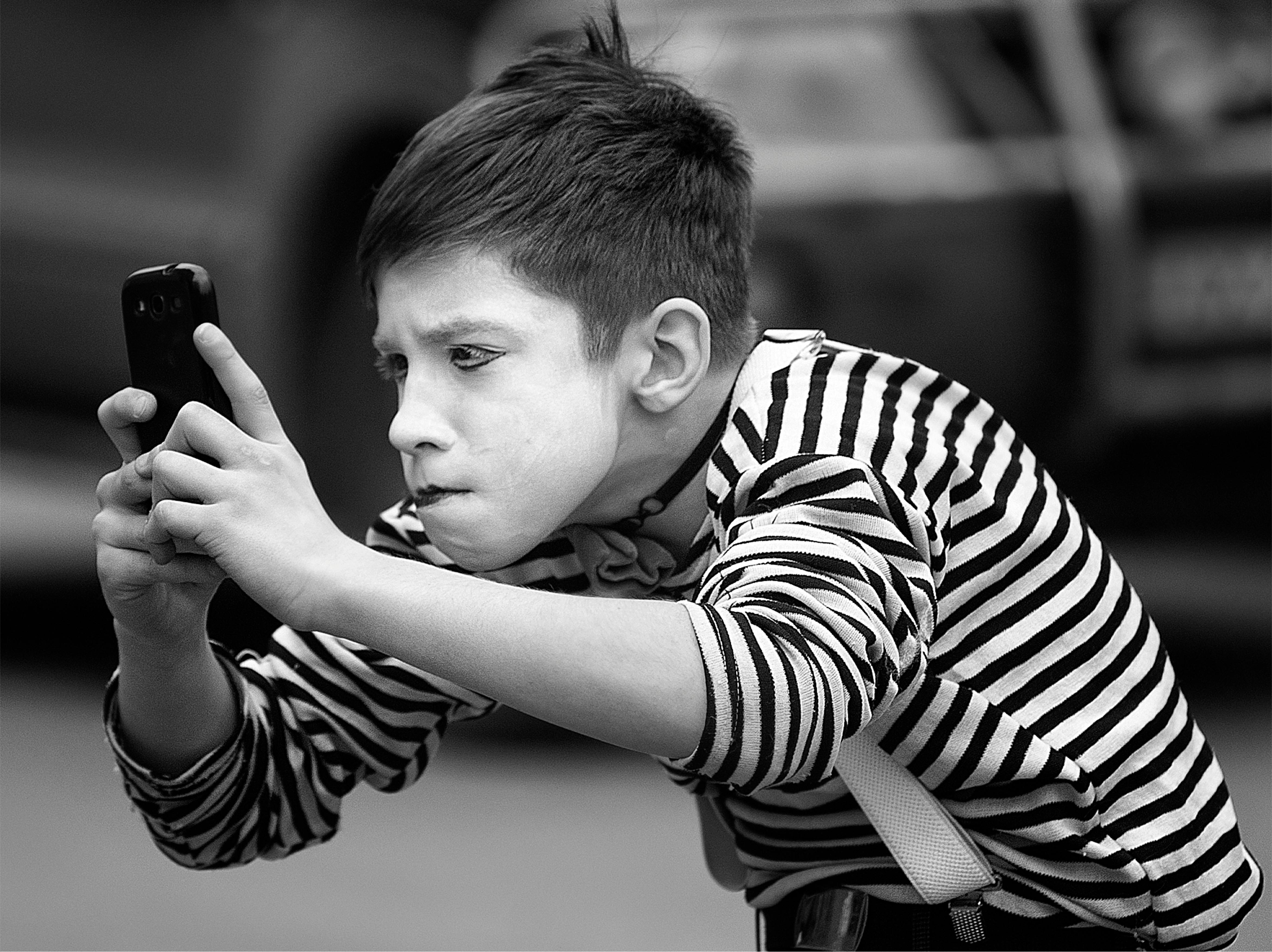 Mime Shooting Photos with a Smartphone · Free Stock Photo