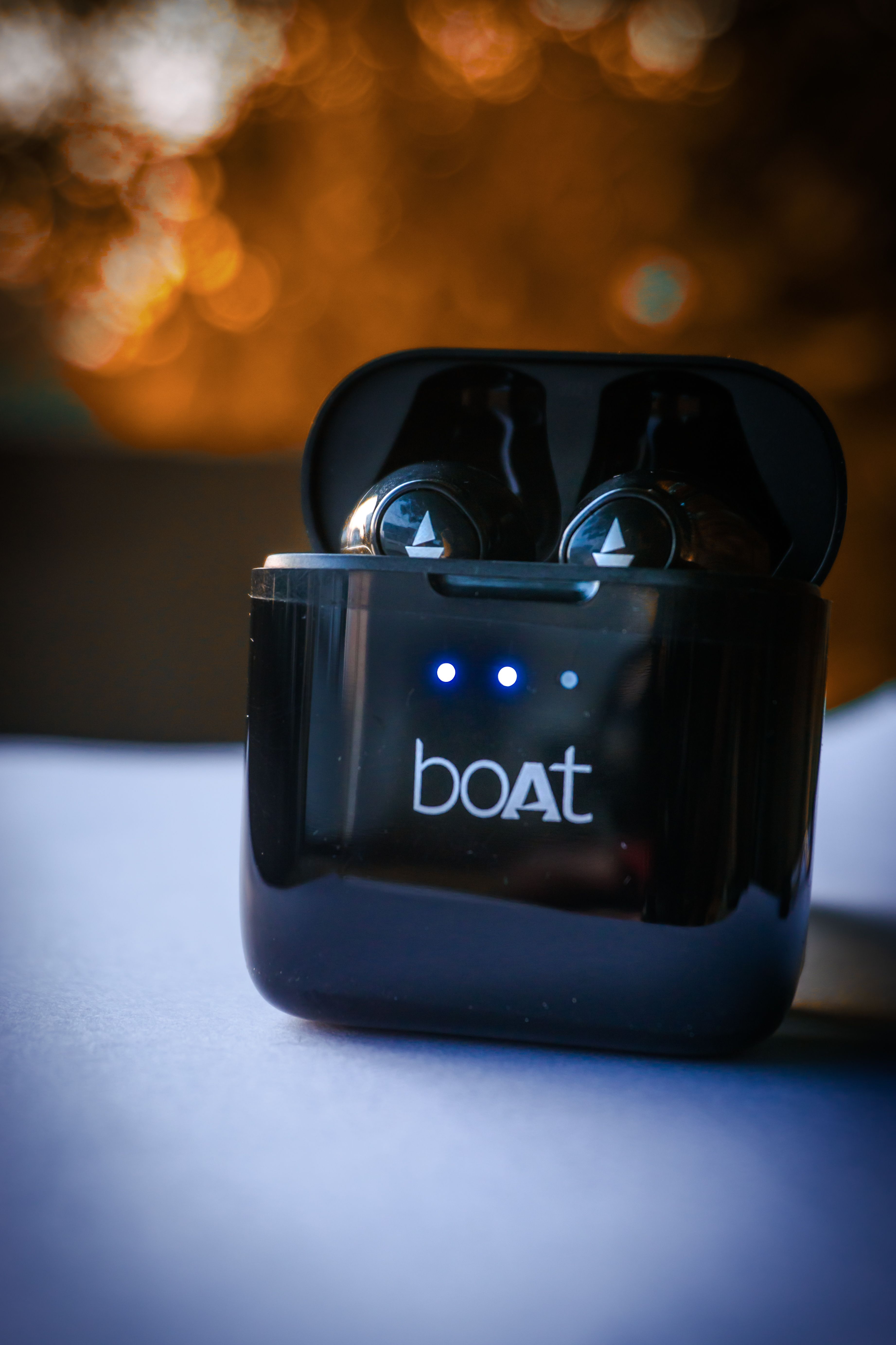 Close-up of Boat Wireless Earbuds Headphones in a Case · Free Stock Photo
