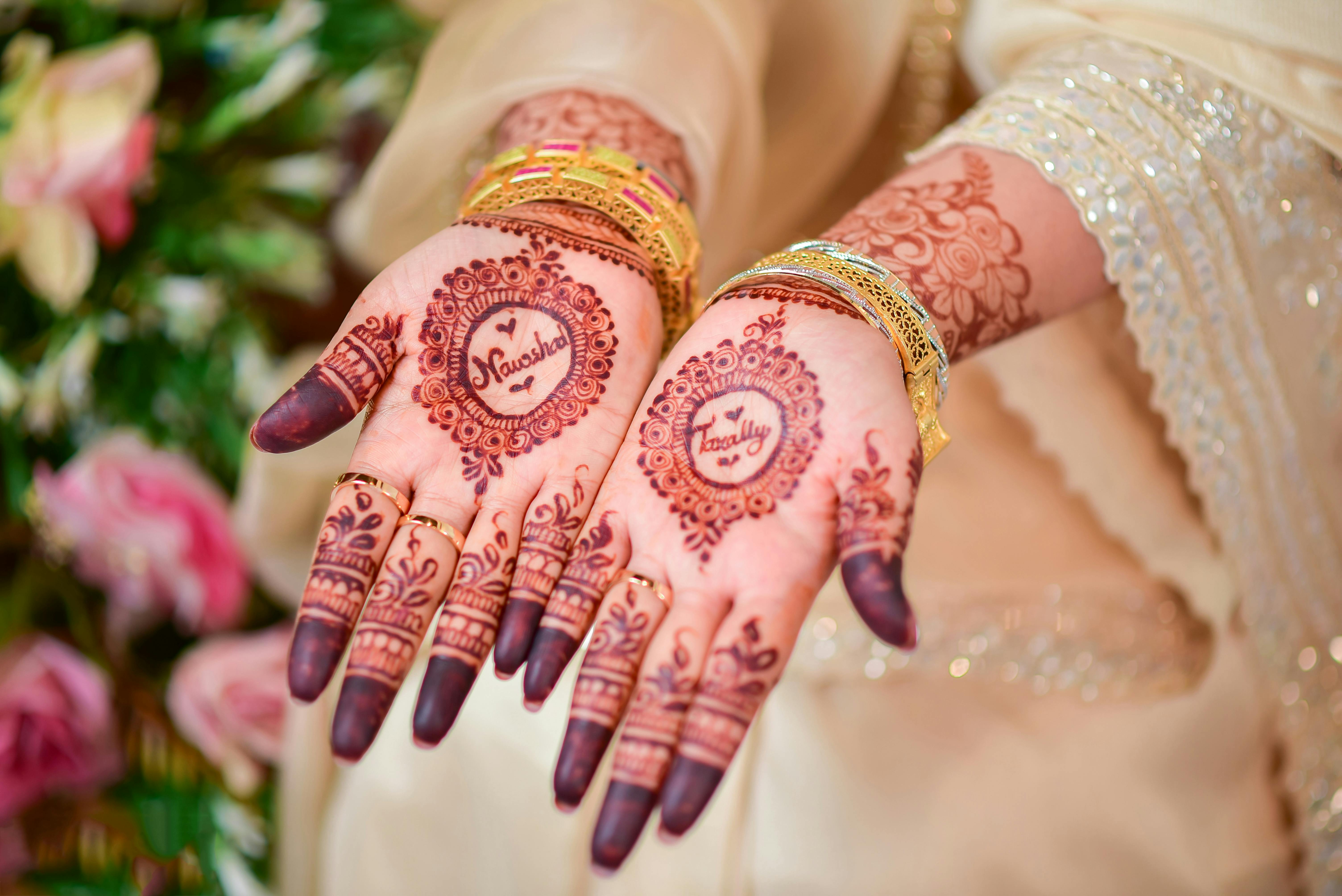 Traditional Henna Tattoos on Hands of Bride in India · Free Stock Photo
