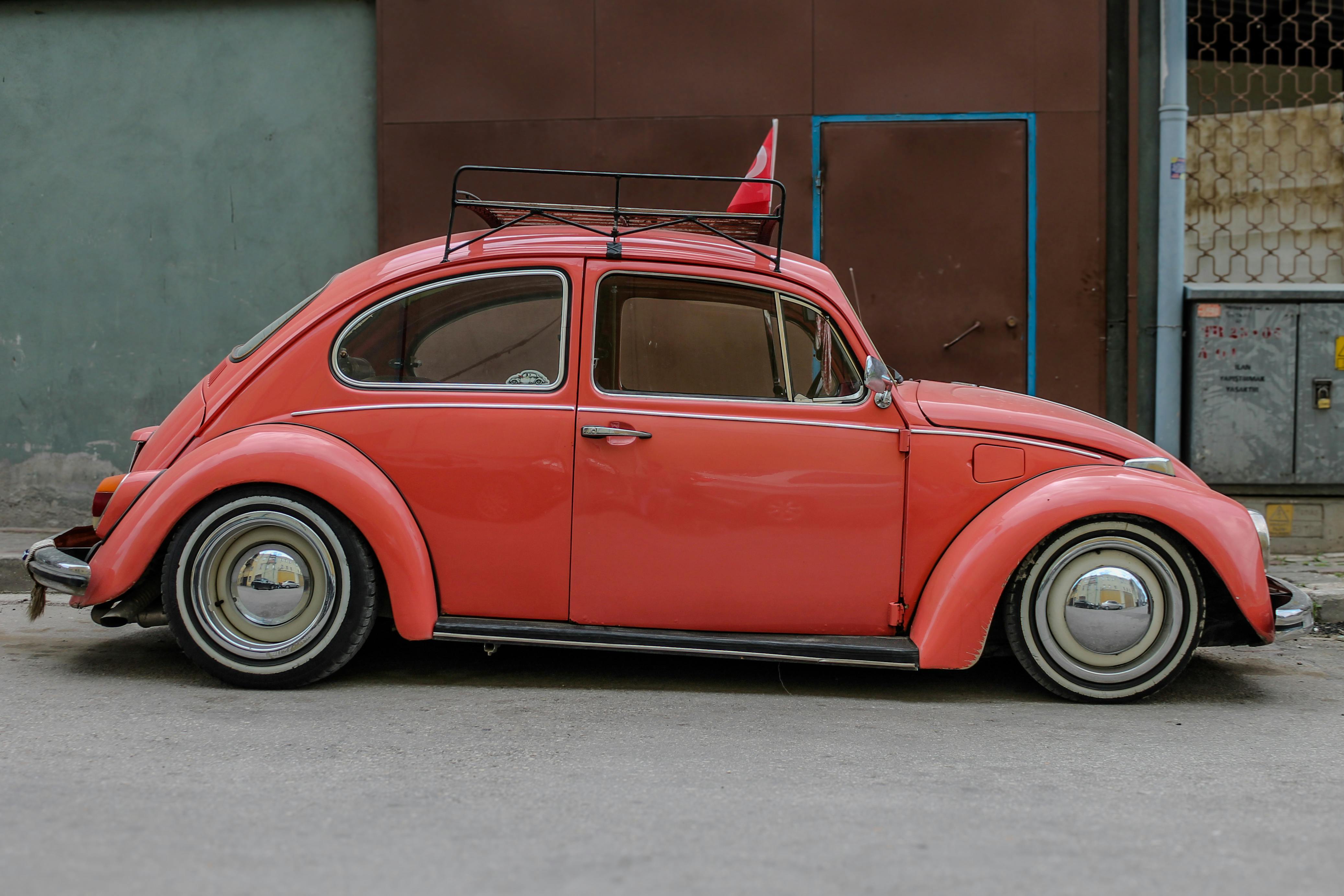 Red Volkswagen Beetle on Street · Free Stock Photo