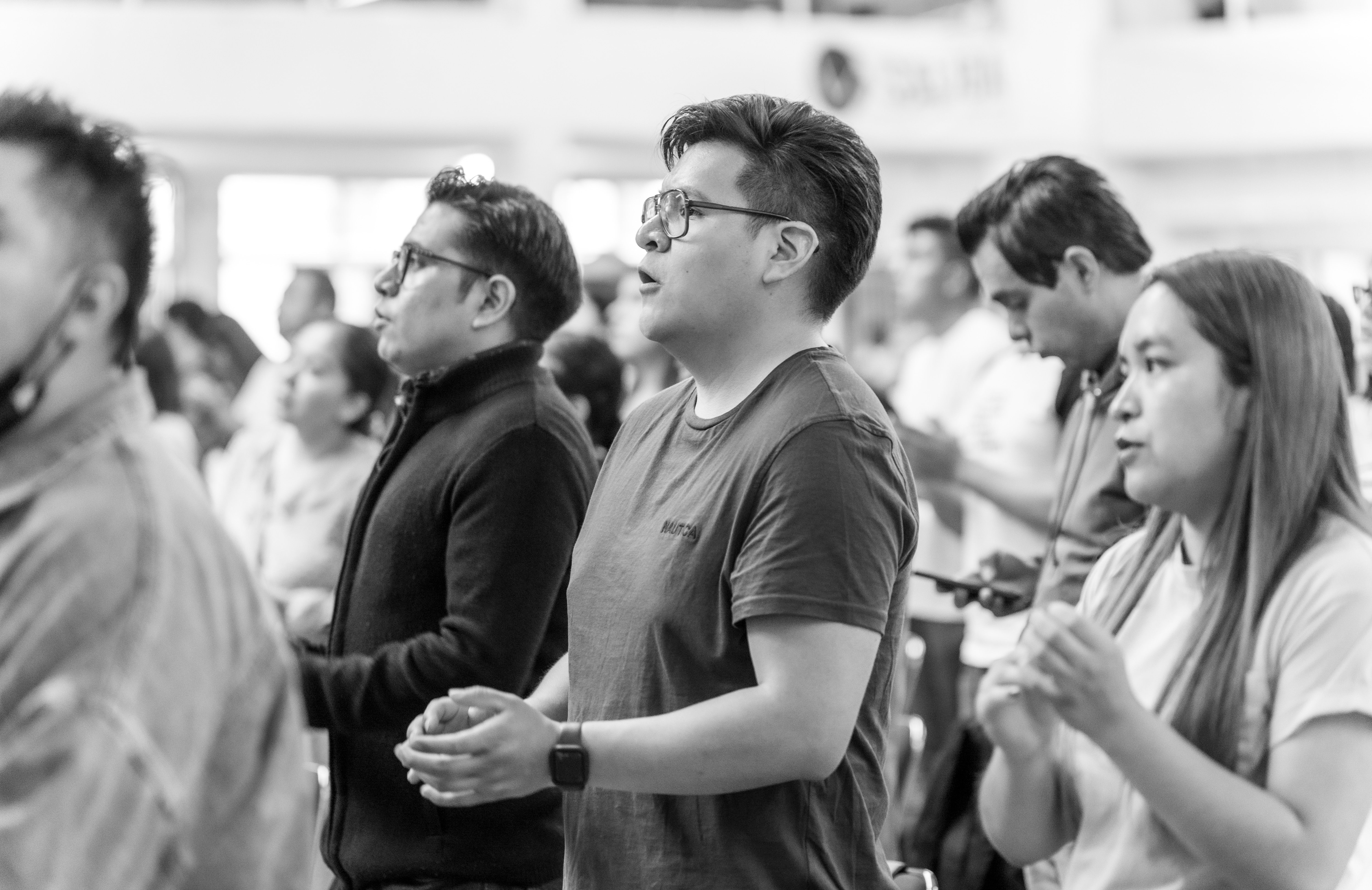 Men and Women Praying at Gathering · Free Stock Photo